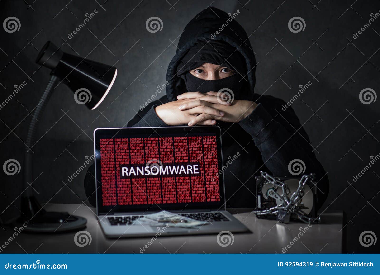 Hacker with Computer Screen Showing Ransomware Attacking Stock Image ...