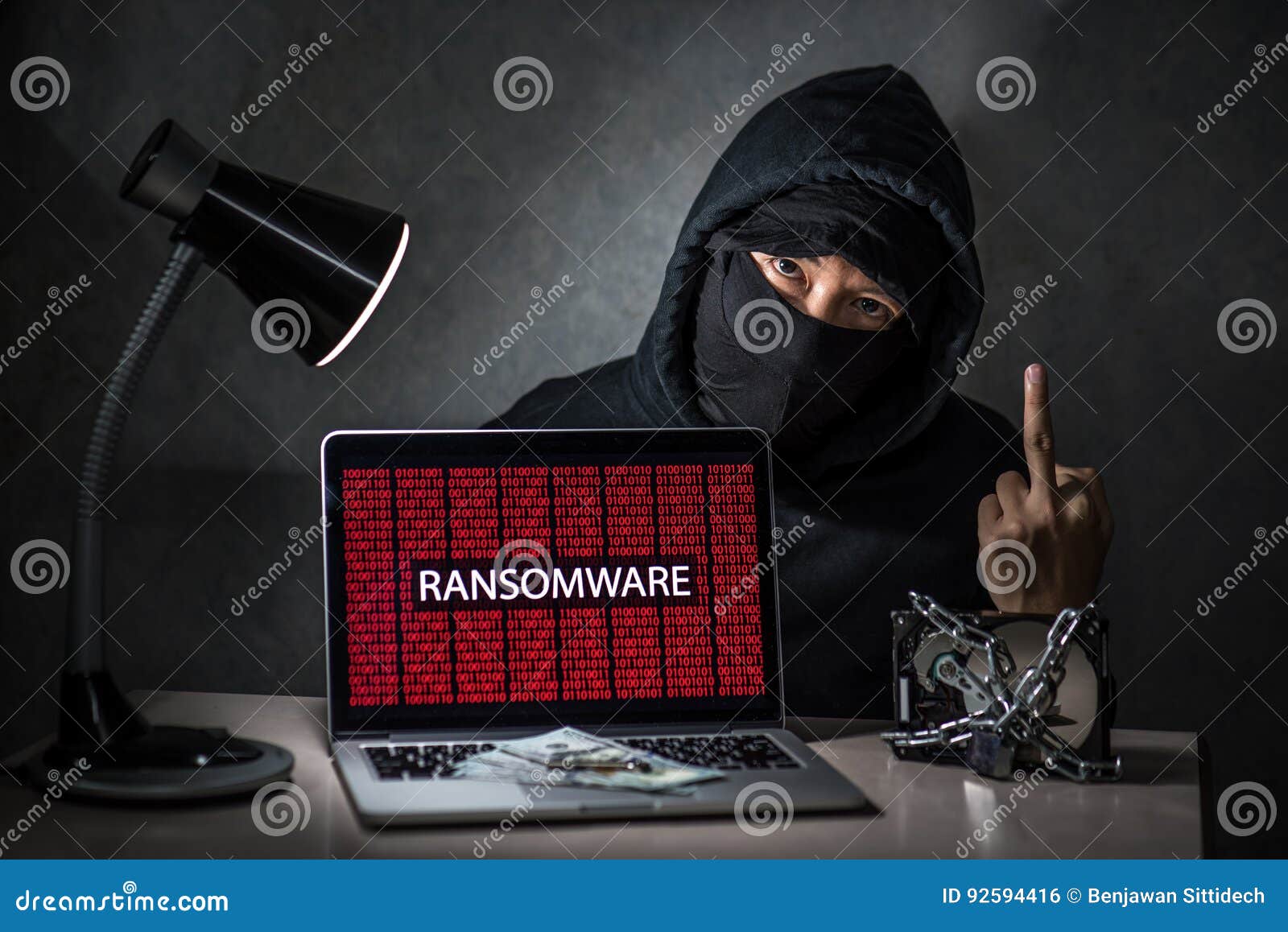 Hacker with Computer Screen Showing Ransomware Attacking Stock Photo ...