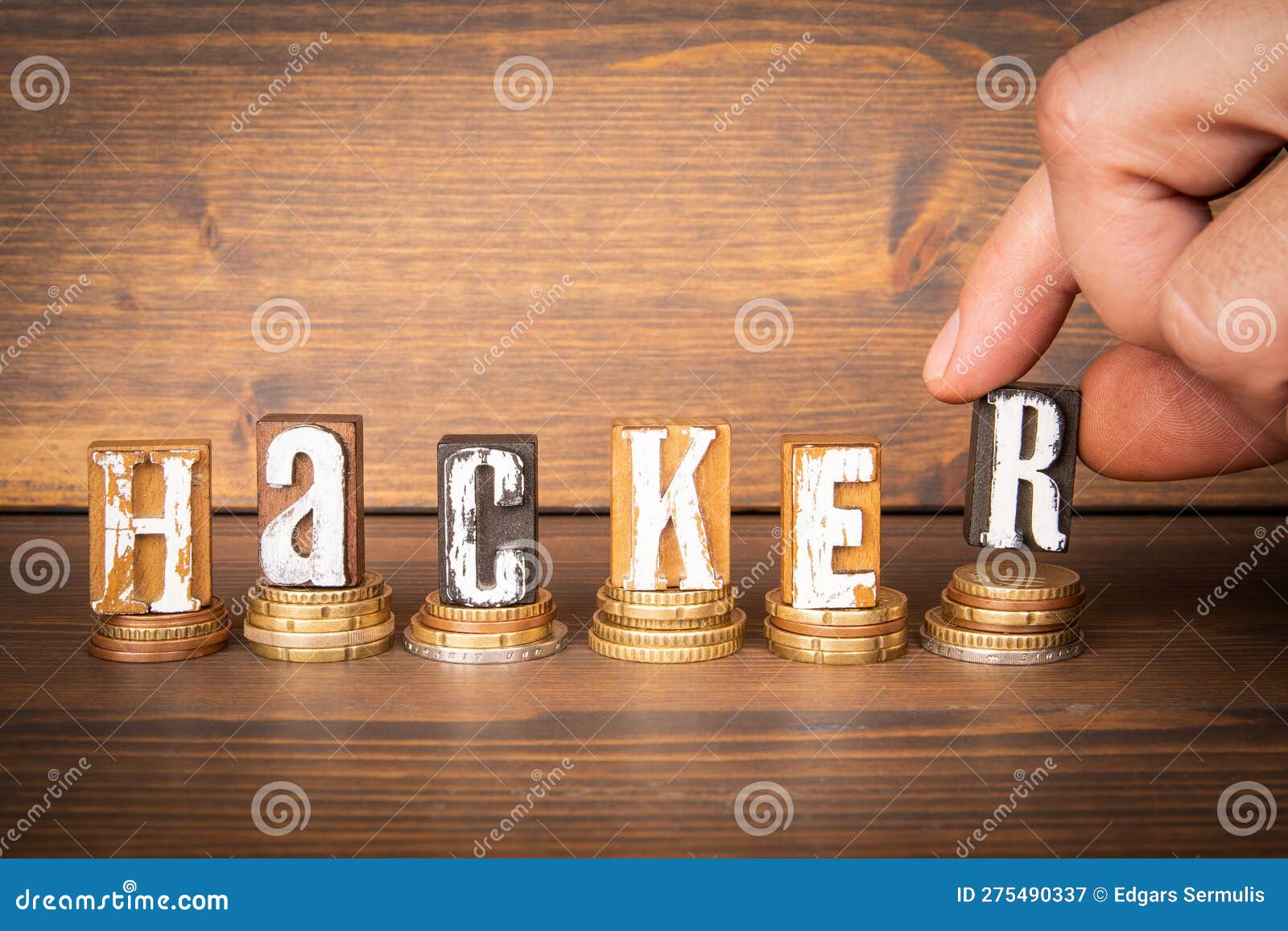 Hacker Concept. Alphabet Blocks and Change on Wood Texture Background ...