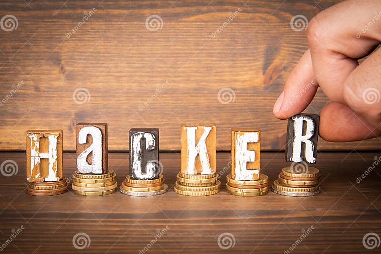 Hacker Concept. Alphabet Blocks and Change on Wood Texture Background ...