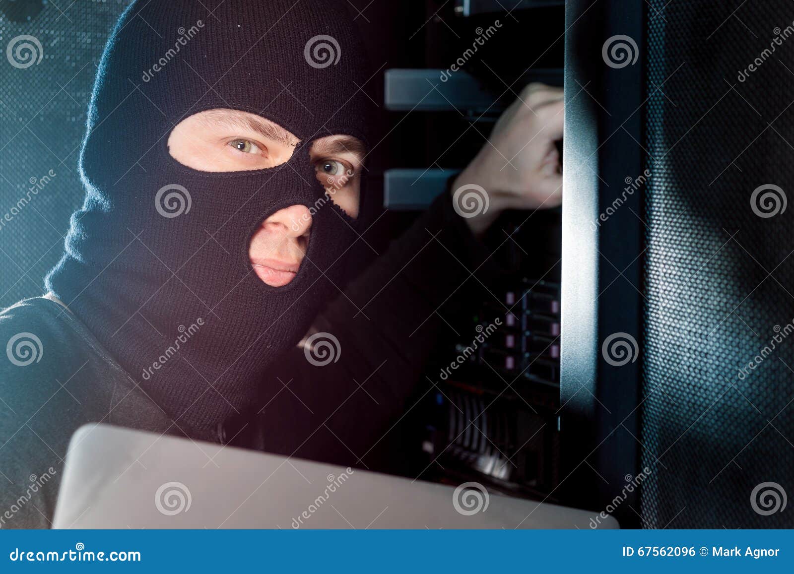 Hacker in a datacenter stock photo. Image of center, help - 67562096