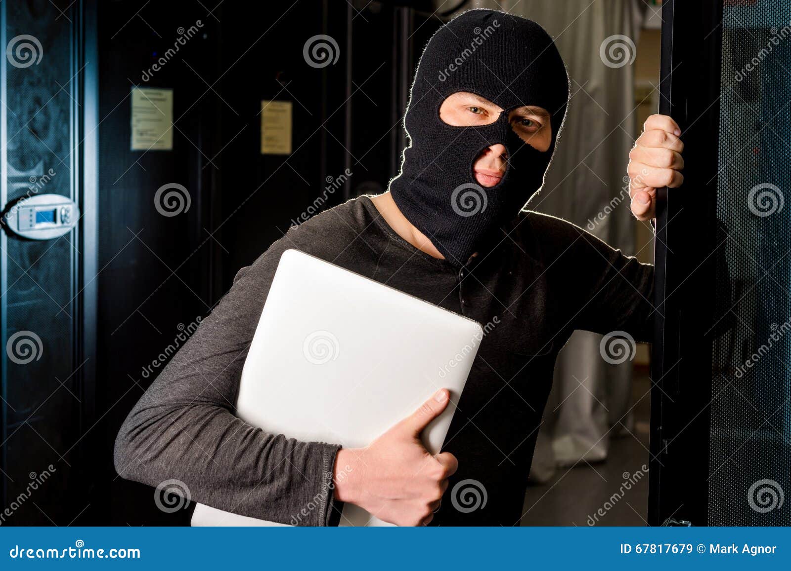 Hacker in a datacenter stock image. Image of adult, criminal - 67817679