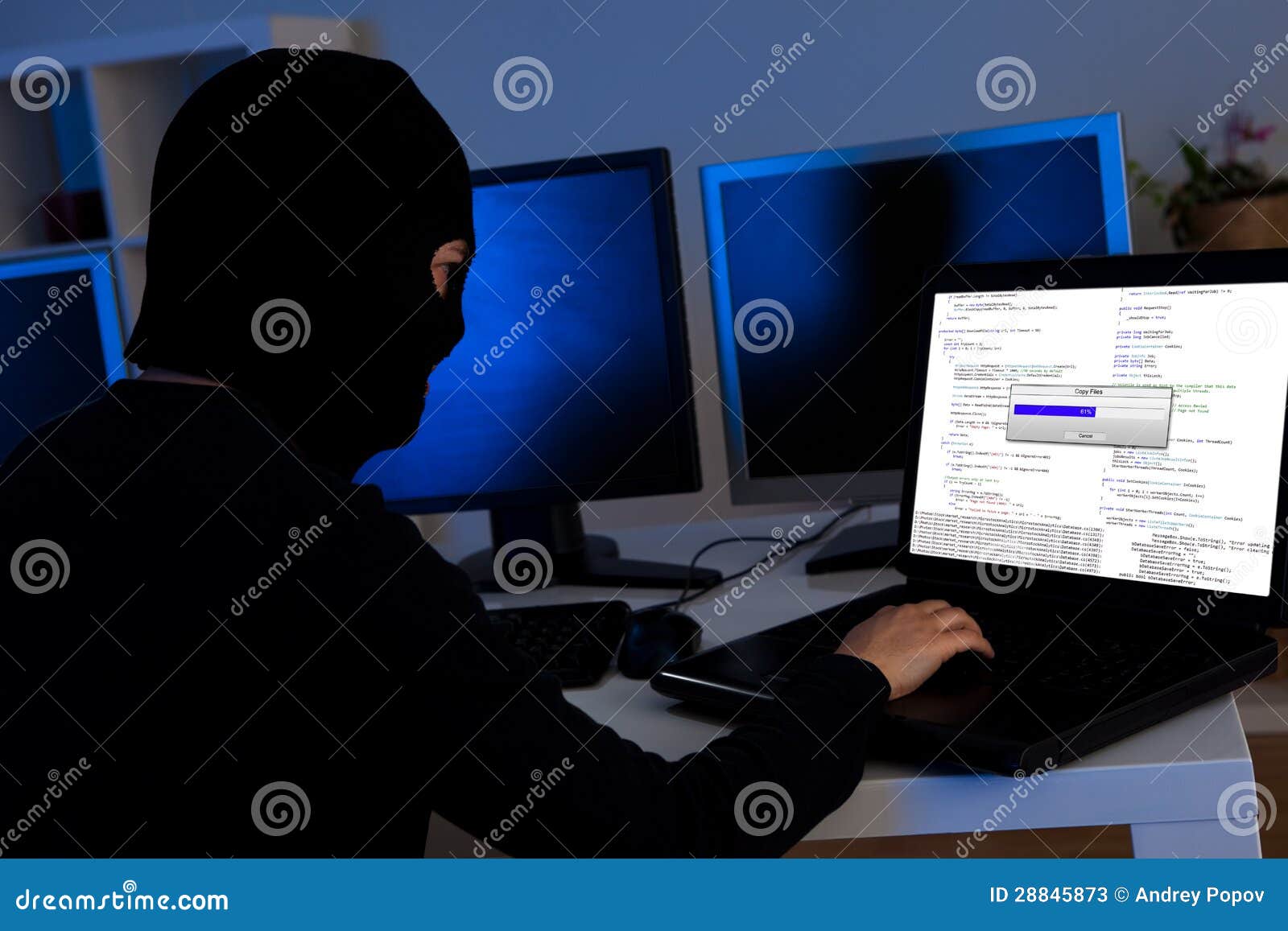 Hacker Downloading Information Off a Computer Stock Image - Image of ...