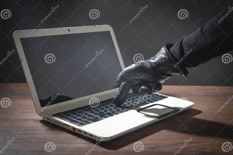 Hacker Hand in a Leather Glove with a Computer Stock Image - Image of ...
