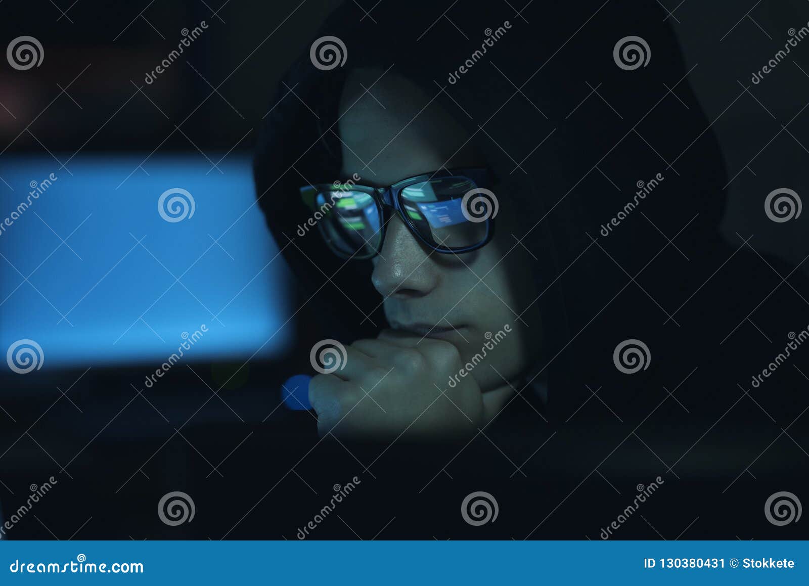 Hacker Hiding in the Dark and Working with Computers Stock Image ...