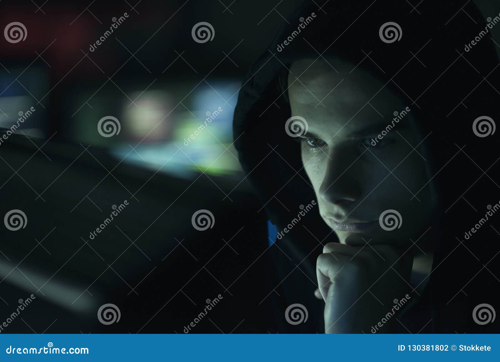 Hacker Hiding in the Dark and Working with Computers Stock Photo ...