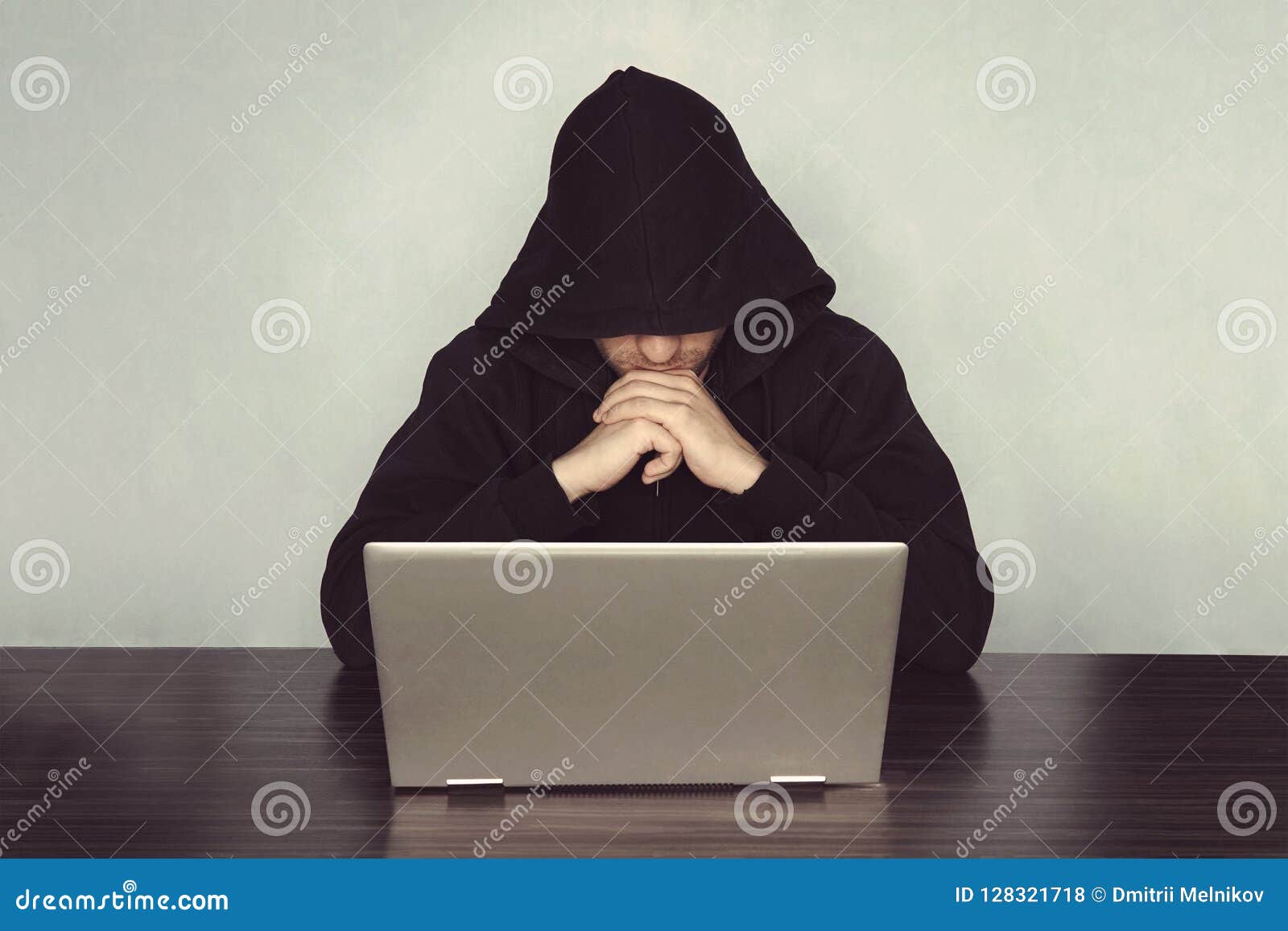 Hacker with His Computer Thinking on Light Blue Background, Monk Hermit ...