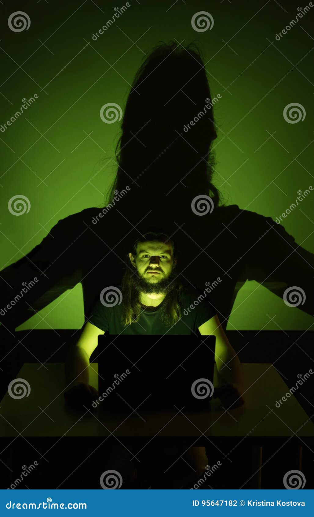 Hacker on His Computer Trying To Enter a Private Porfile Stock Photo ...
