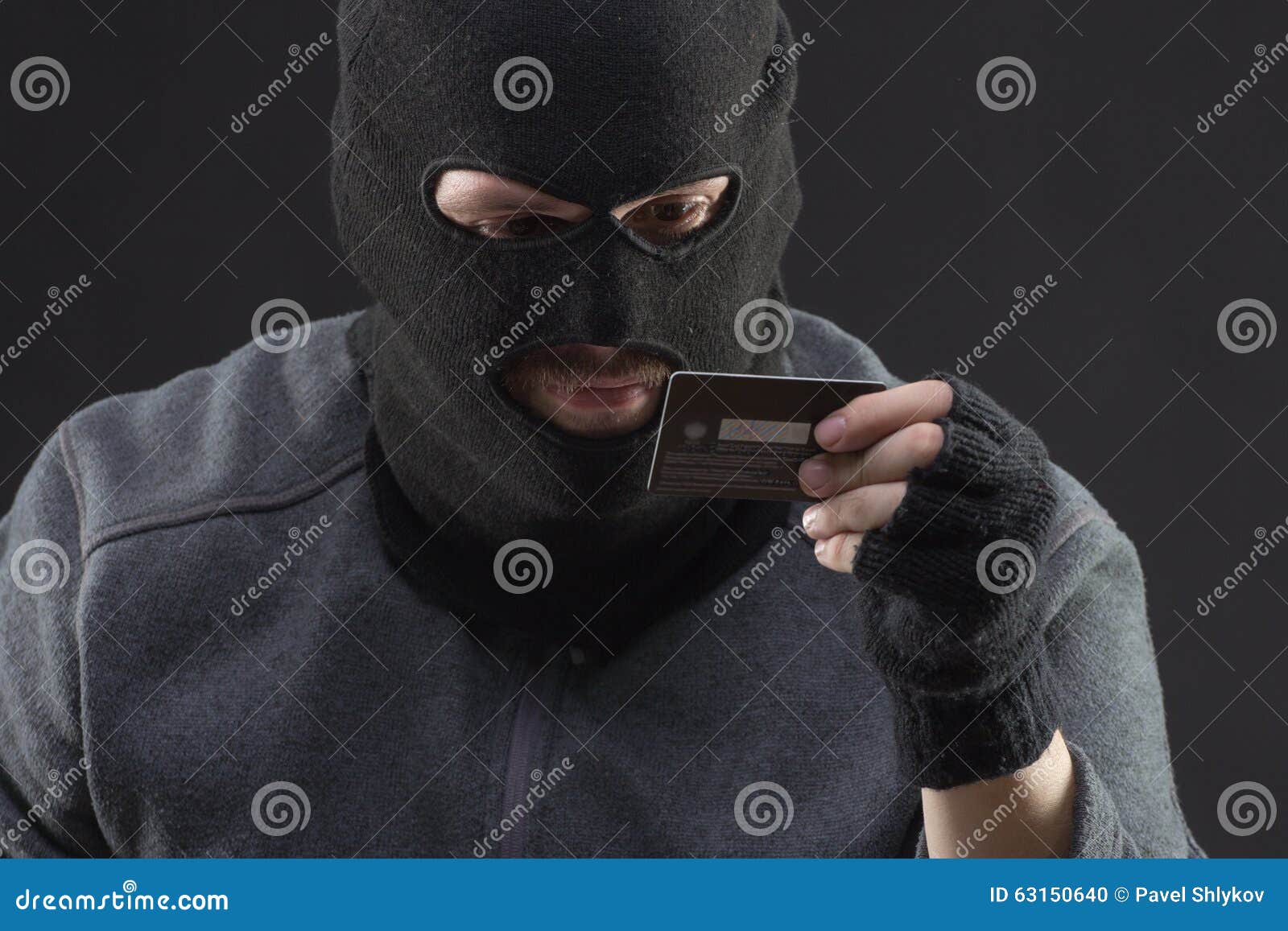 Hacker Hold Stolen Credit Card Stock Photo - Image of data, card: 63150640