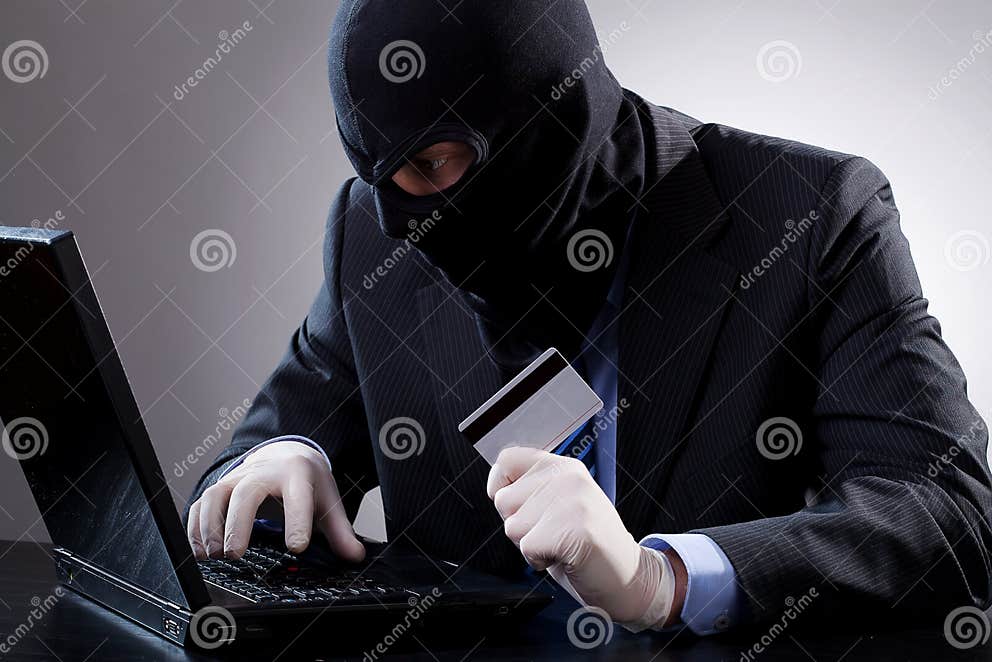 Hacker Holding a Credit Card Stock Image - Image of sneak, illegal ...