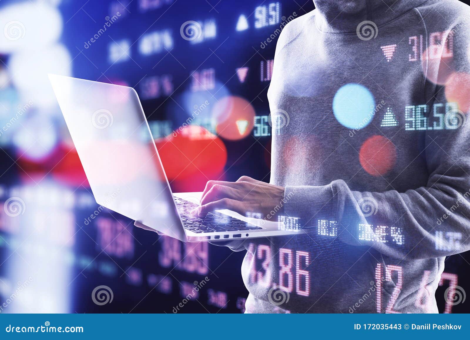 Hacker Holding Laptop and Business Statistics Hologram Stock Image ...