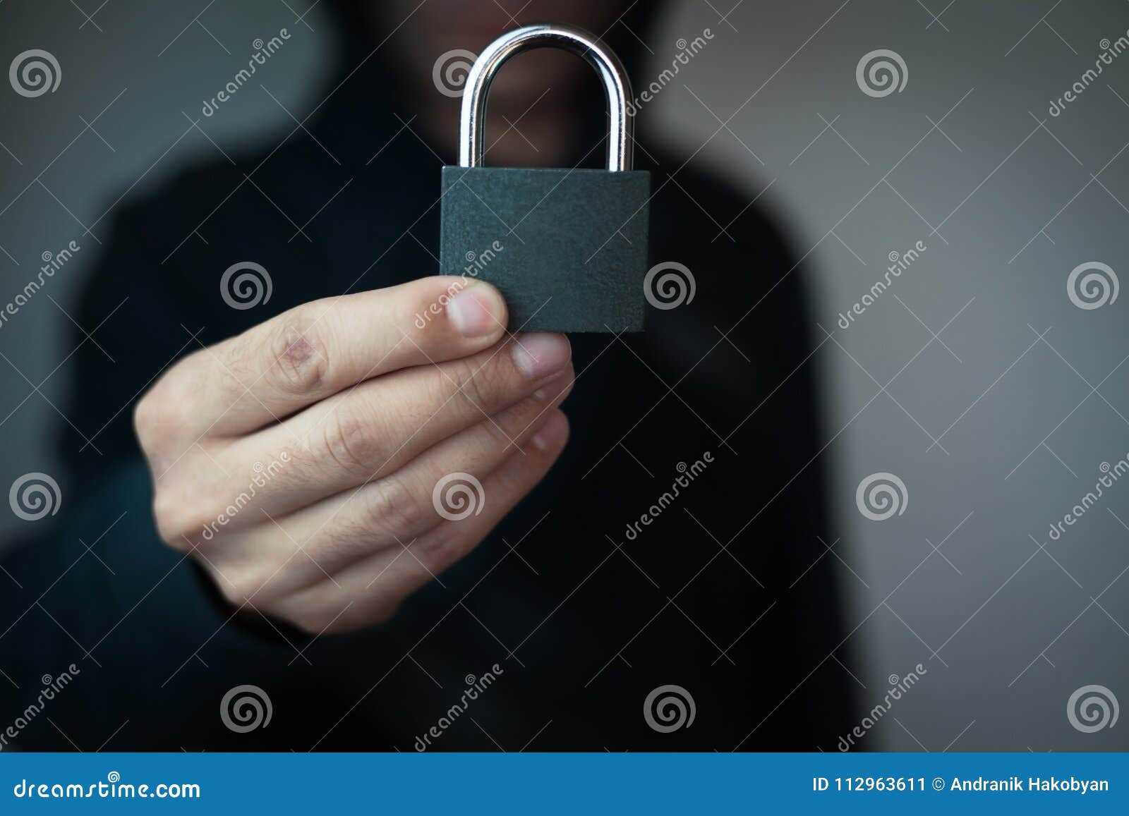 Hacker holding lock. stock image. Image of dark, access - 112963611