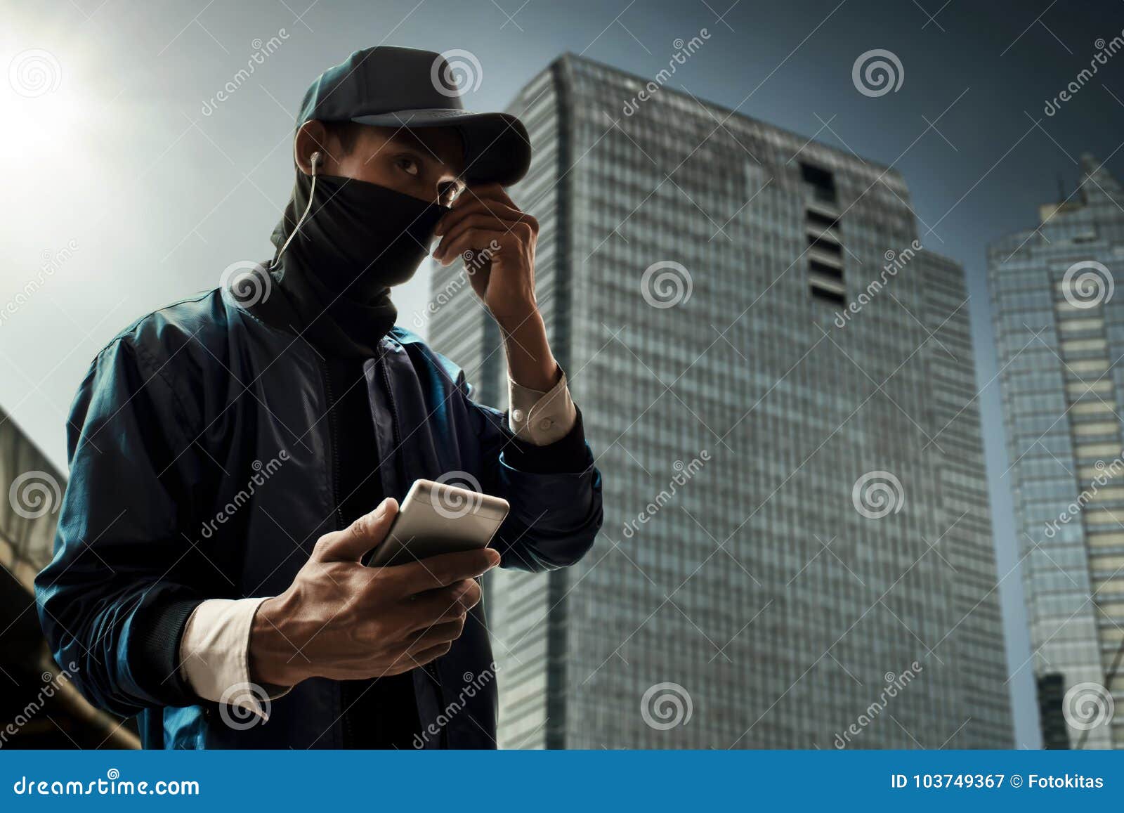 Hacker Holding Mobile Phone Stock Image - Image of dangerous, person ...