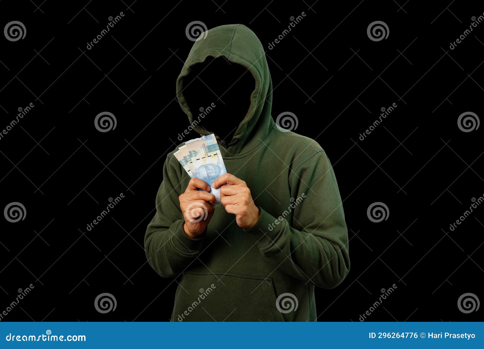 Hacker Holding Rupiah Paper Money On Black Background Royalty-Free ...