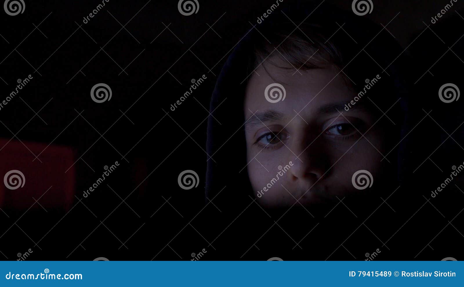 Hacker in Hood Cracking Code Using Computers in Dark Room Close Up ...