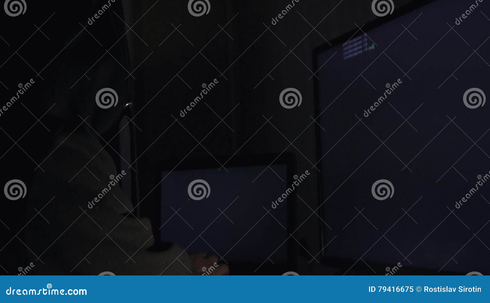 Hacker in Hood Cracking Code Using Computers in Dark Room Stock Video ...