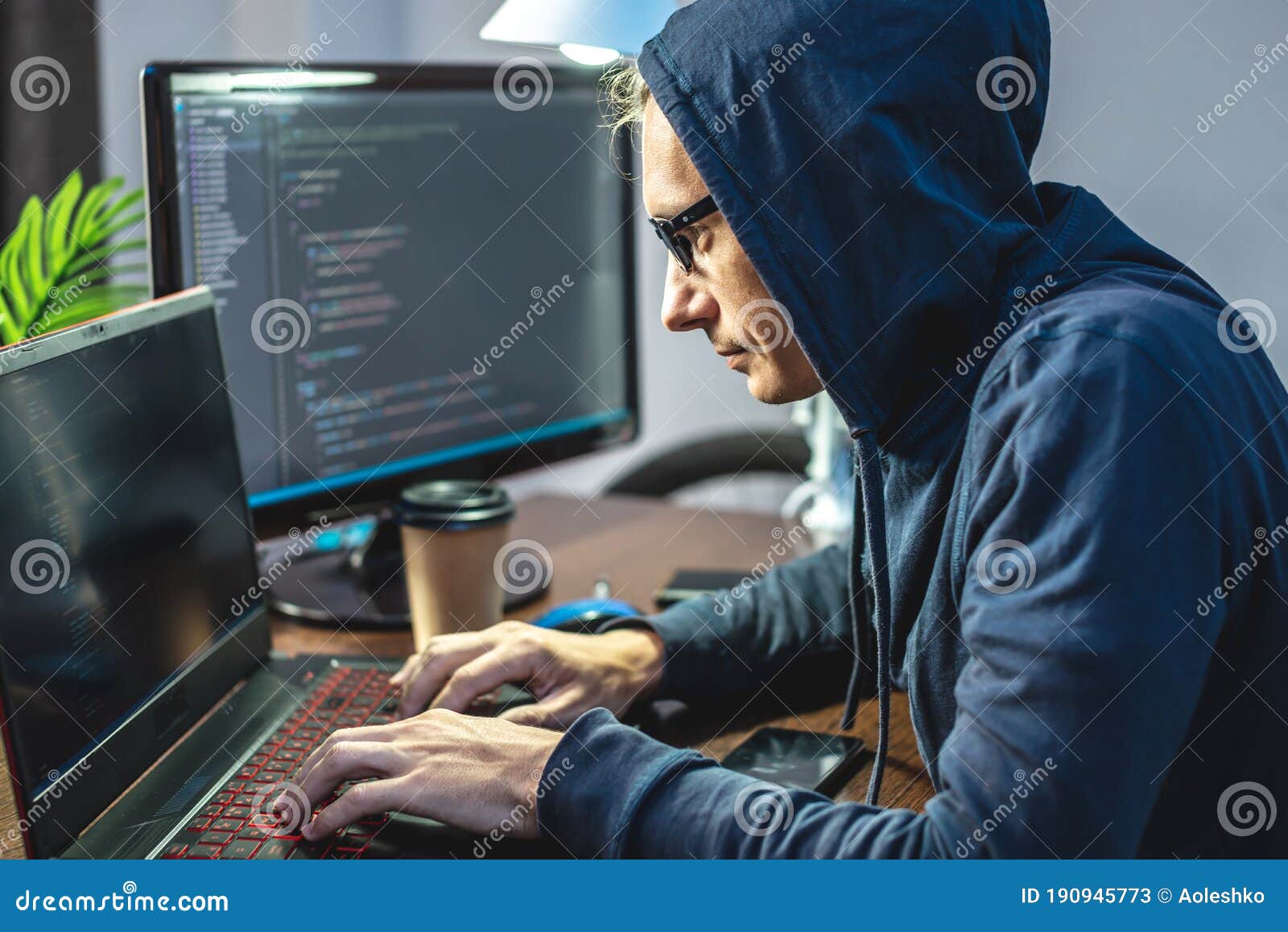Hacker in the Hood is Programming Virus Code at the Keyboard for the ...