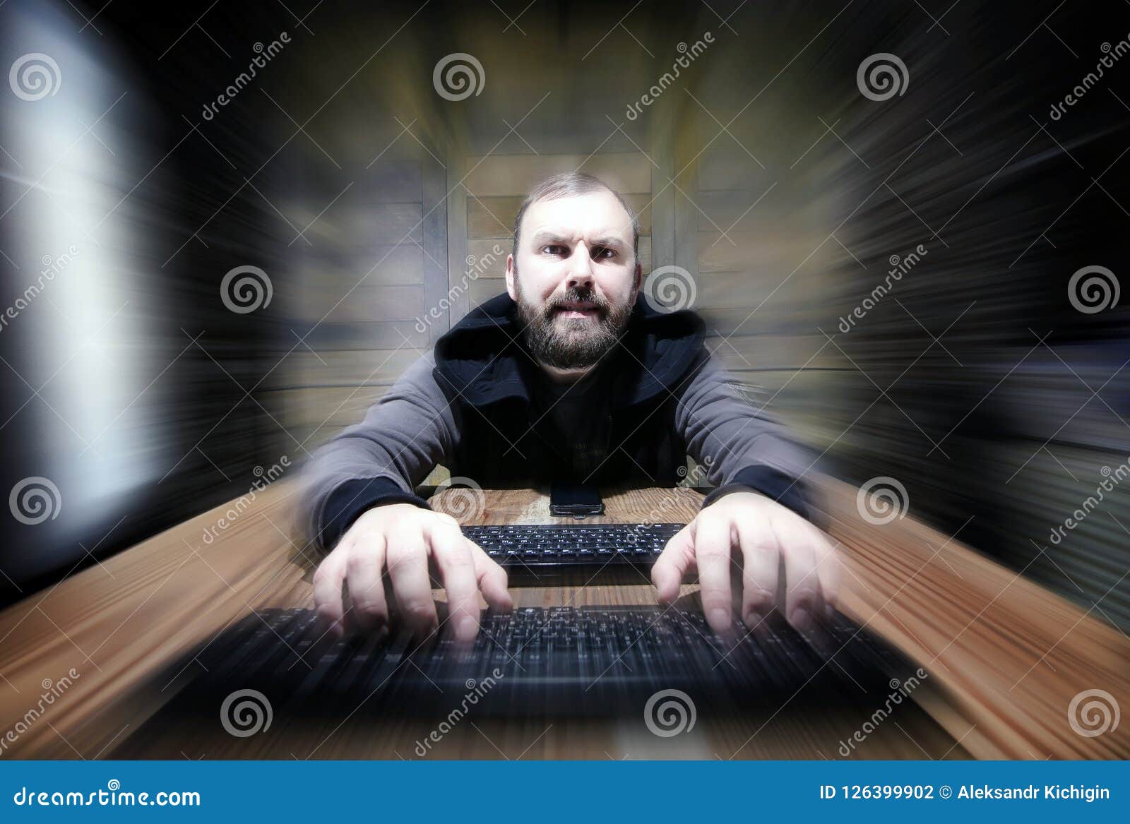 The Hacker in the Hood Sits and Works Stock Photo - Image of dark ...