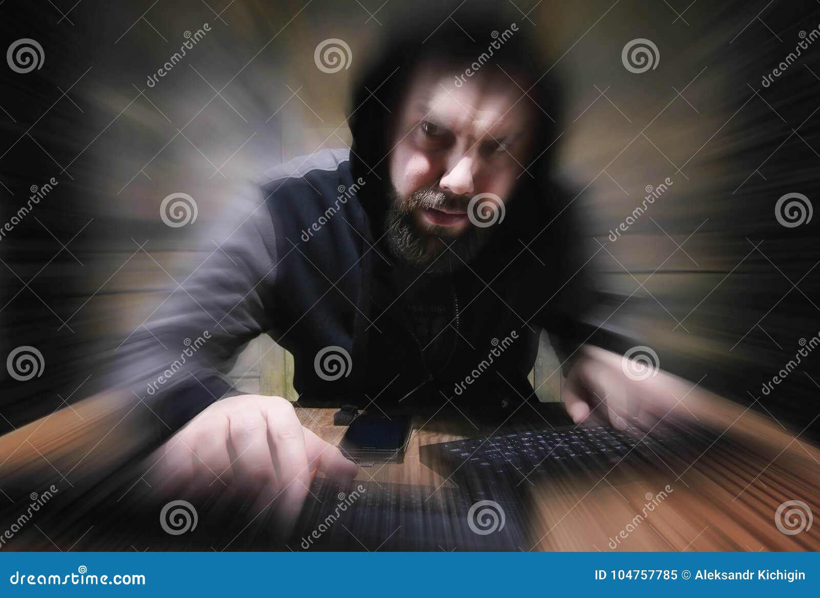 The Hacker in the Hood Sits and Works Stock Image - Image of male ...