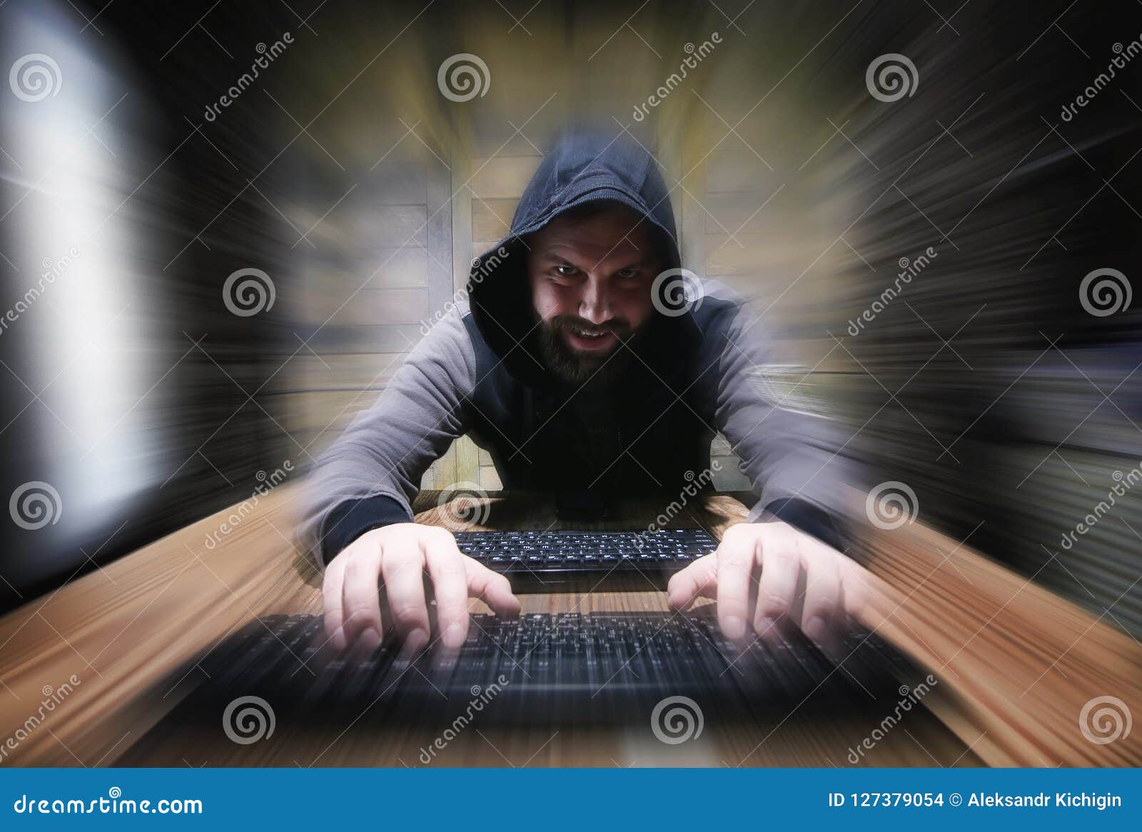 The Hacker in the Hood Sits and Works Stock Photo - Image of illegal ...