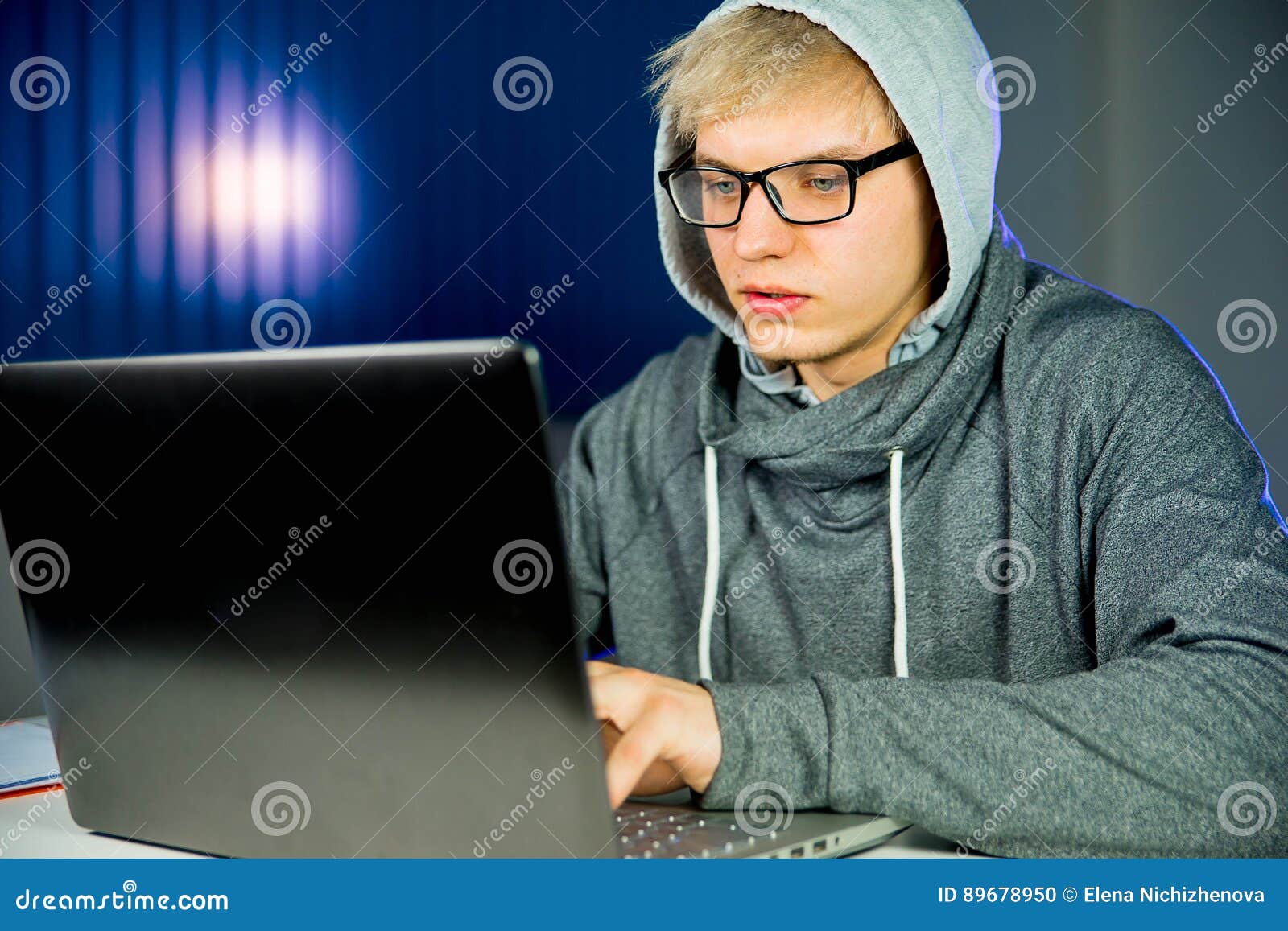 Hacker in a hood stock photo. Image of laptop, businesswoman - 89678950