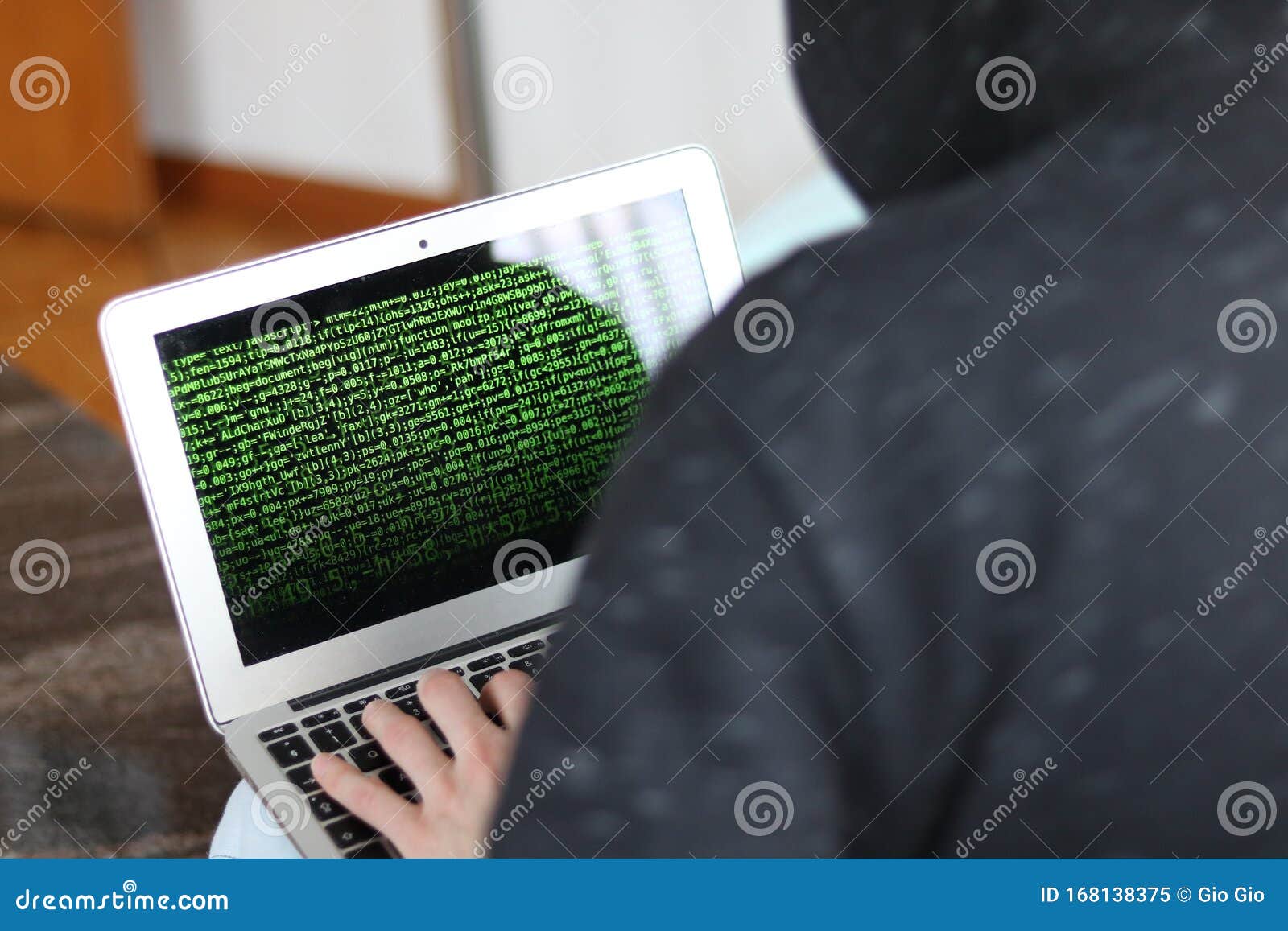 Hacker with Hood Typing on Computer Laptop Stock Image - Image of ...
