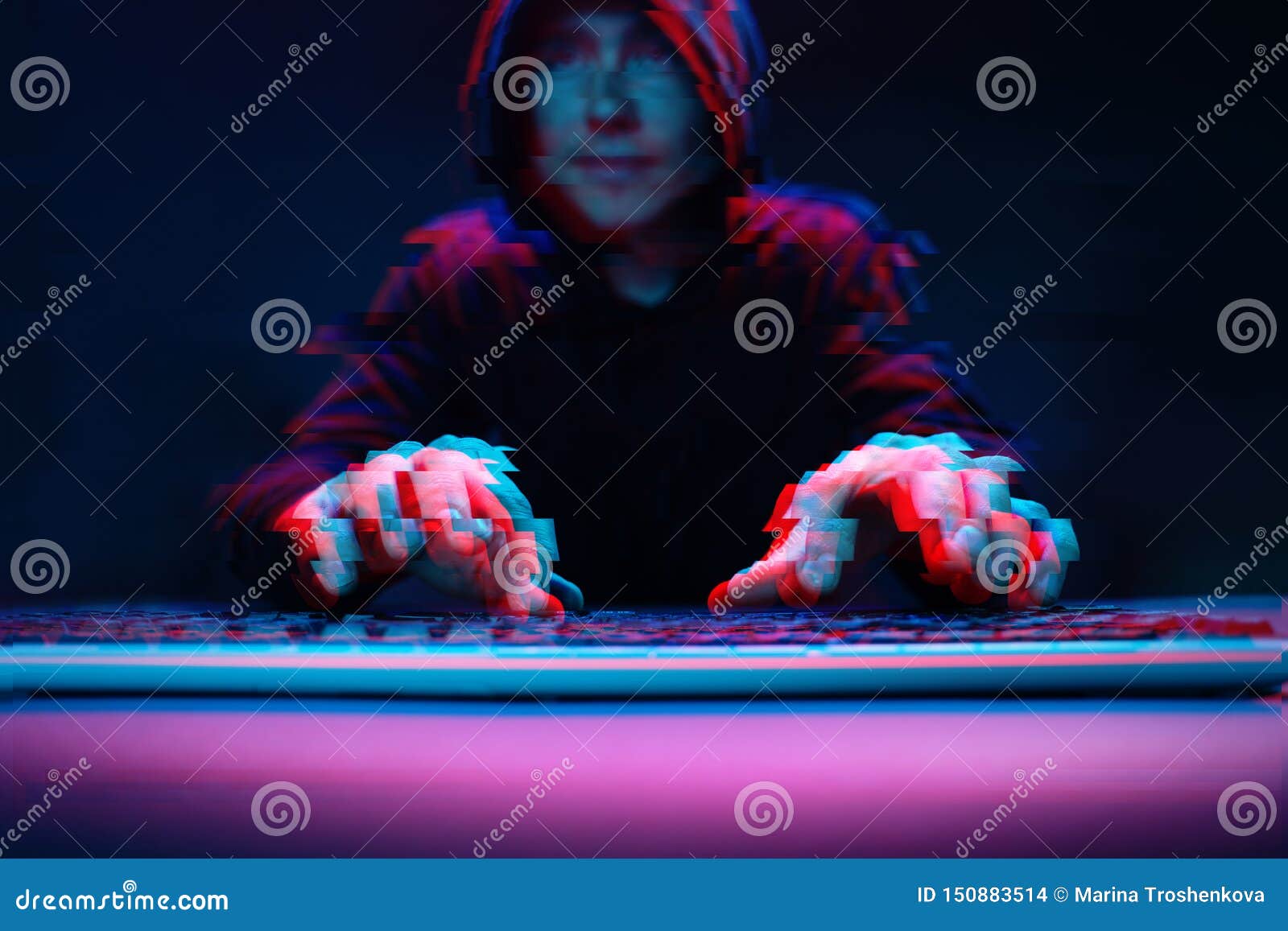 Hacker in the Hood Working with Computer Typing Text in Dark Room ...