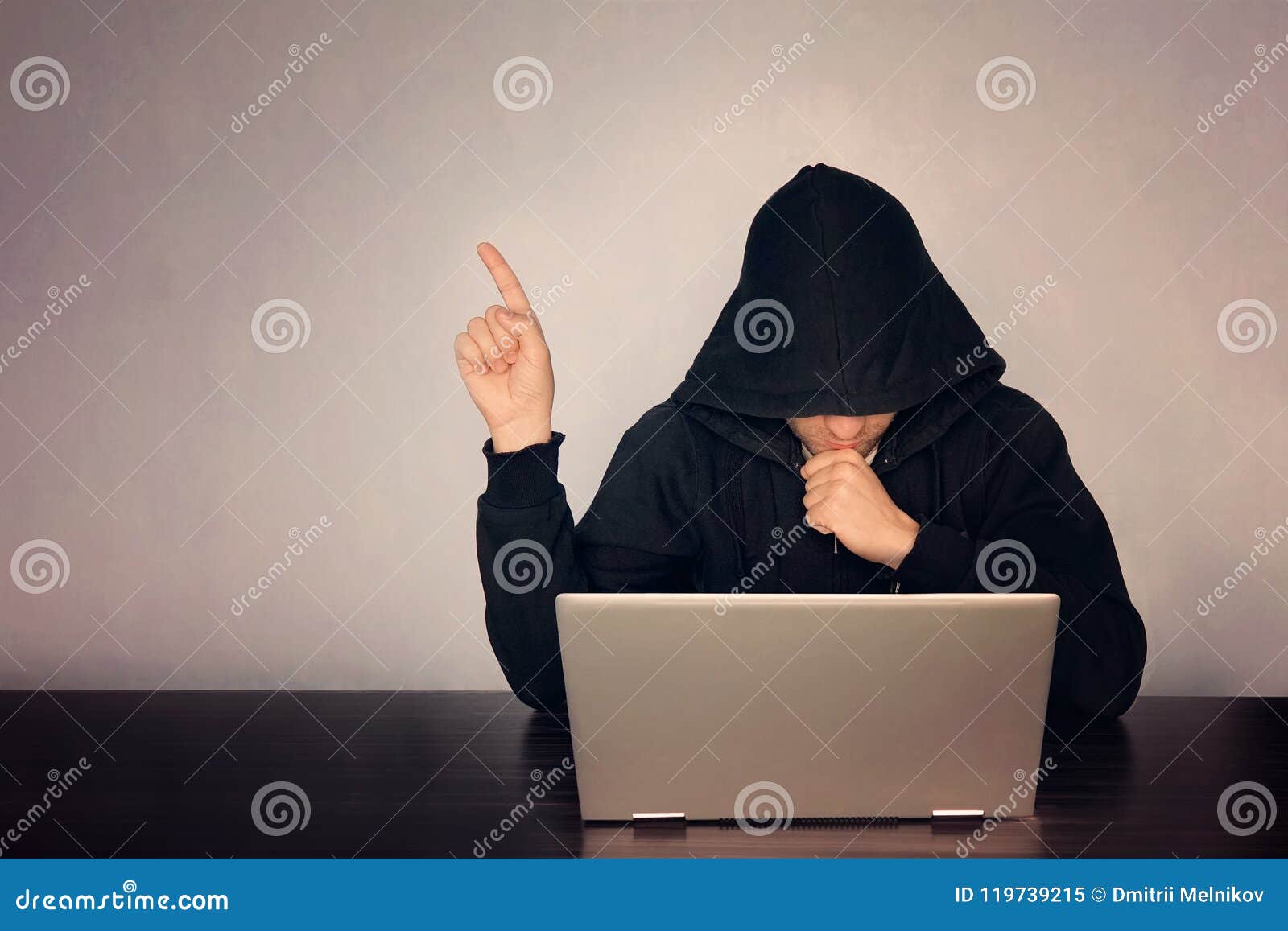 Hacker Hooded in Front of His Computer Show Finger. Dark Face. Hooded ...