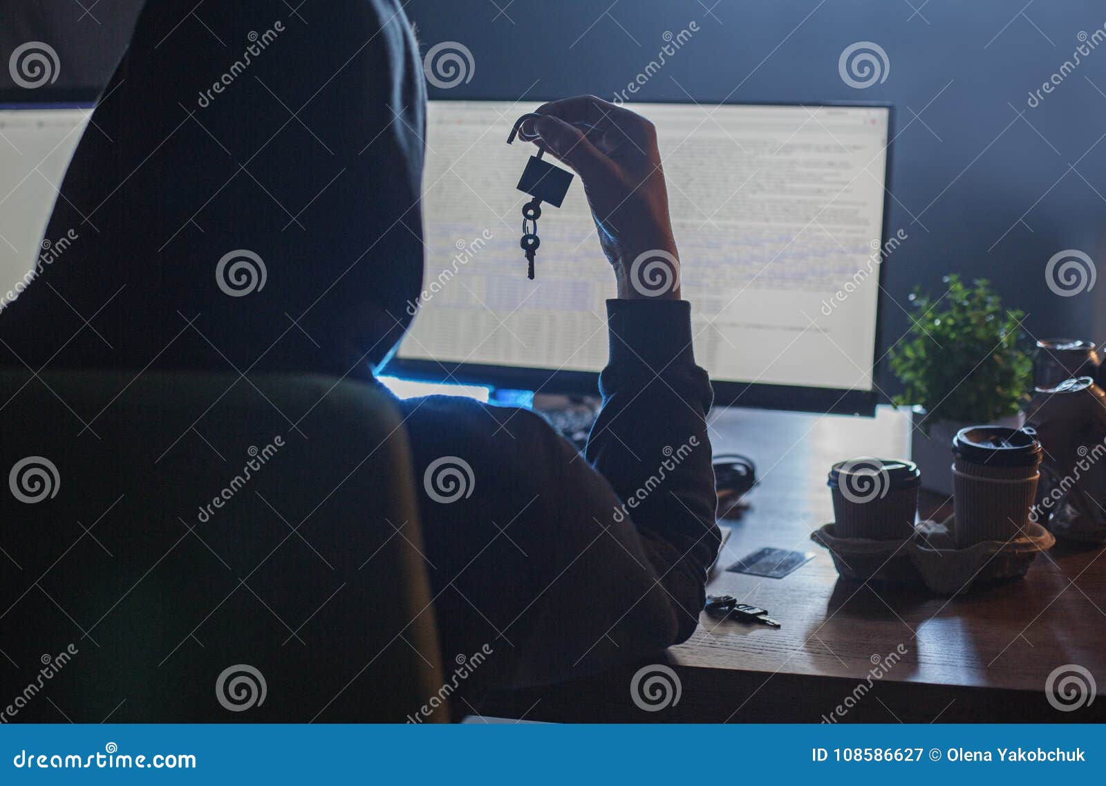 Computer Burglar Downloading Information from Digital Device Stock ...