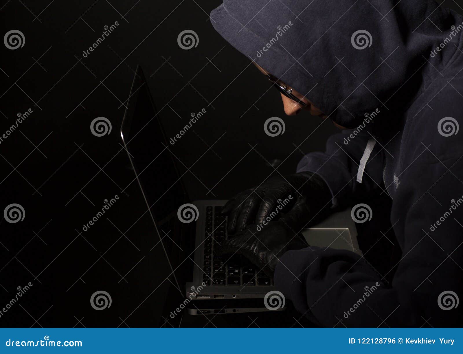 Hacker on a Laptop.Concept of Internet Criminal Hacking Stock Photo ...