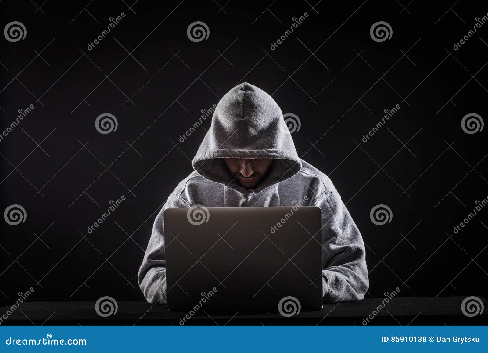 Hacker on a laptop stock photo. Image of mask, secure - 85910138