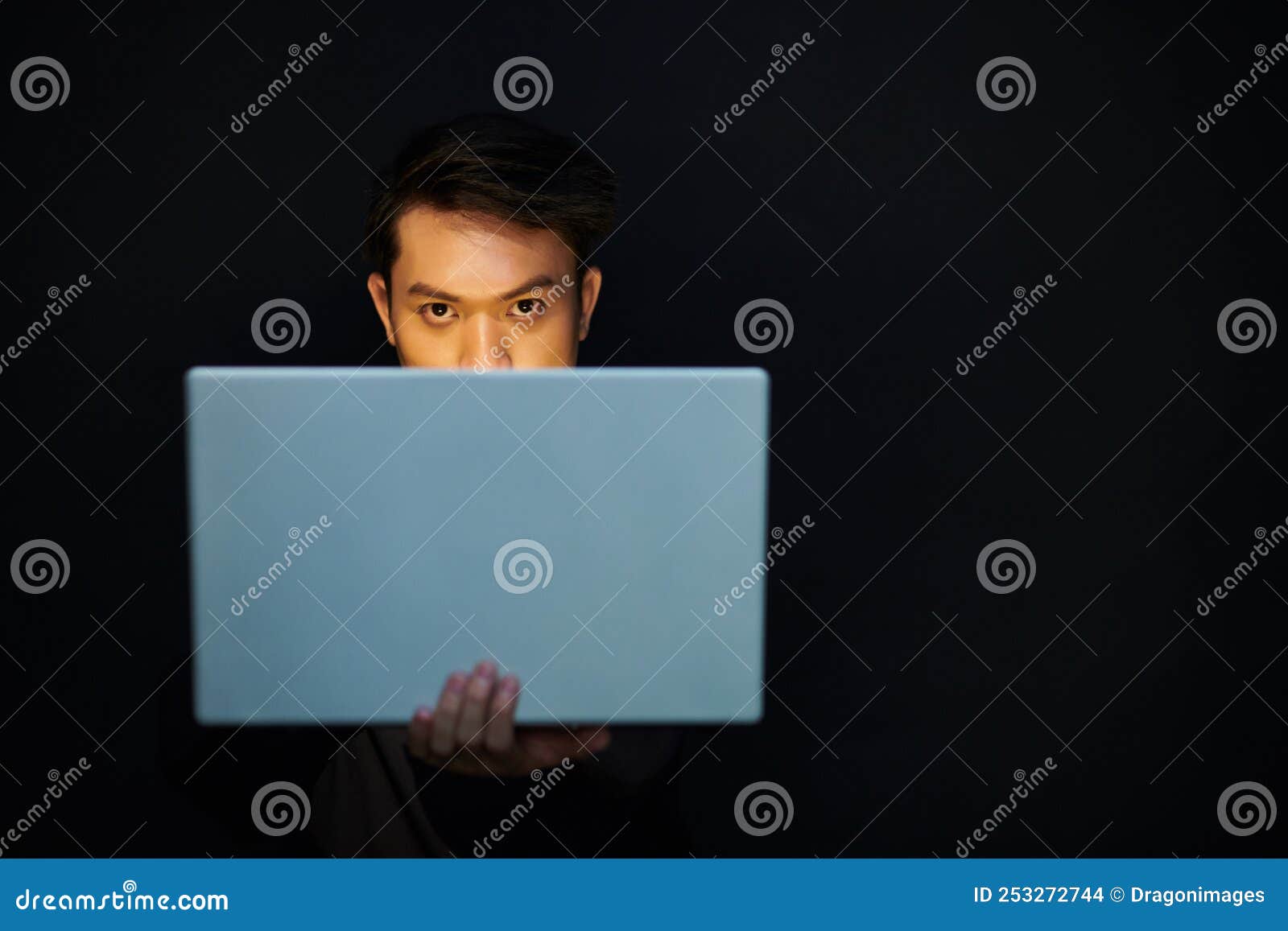 Hacker with Laptop Looking at Camera Stock Photo - Image of manager ...