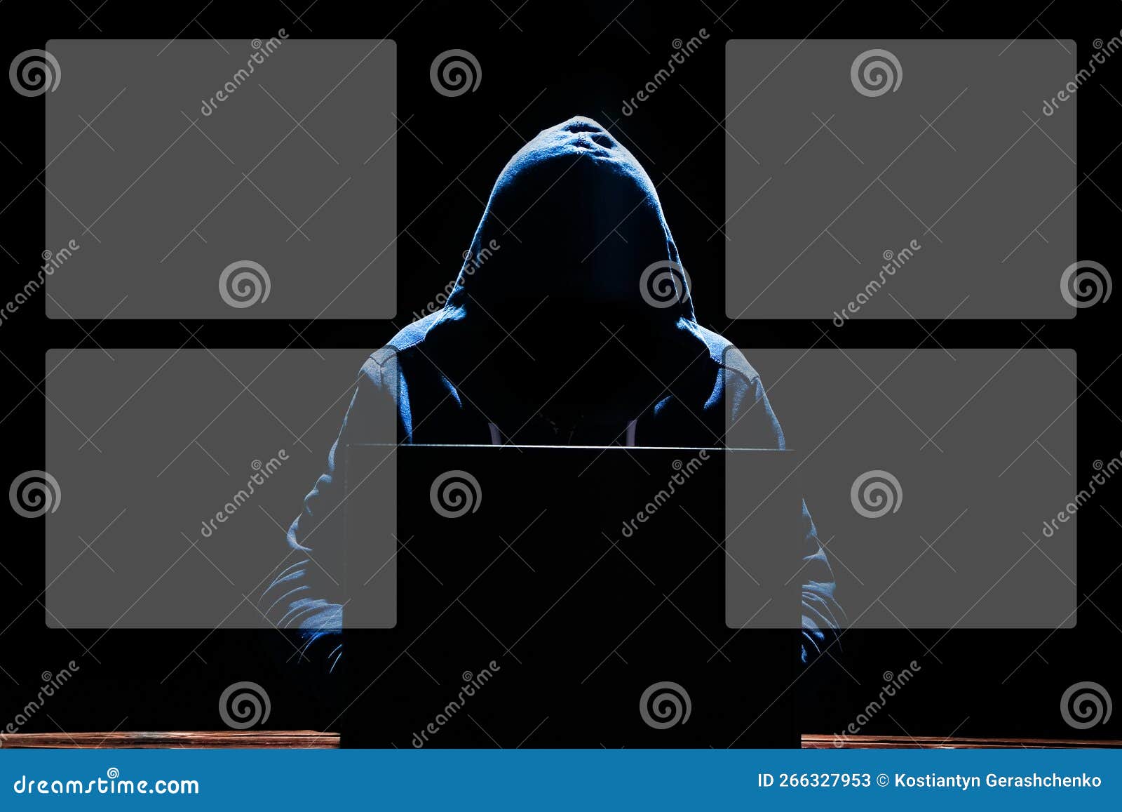 A Hacker with Laptop Sits at a Table and Abstract Binary Code. Business ...