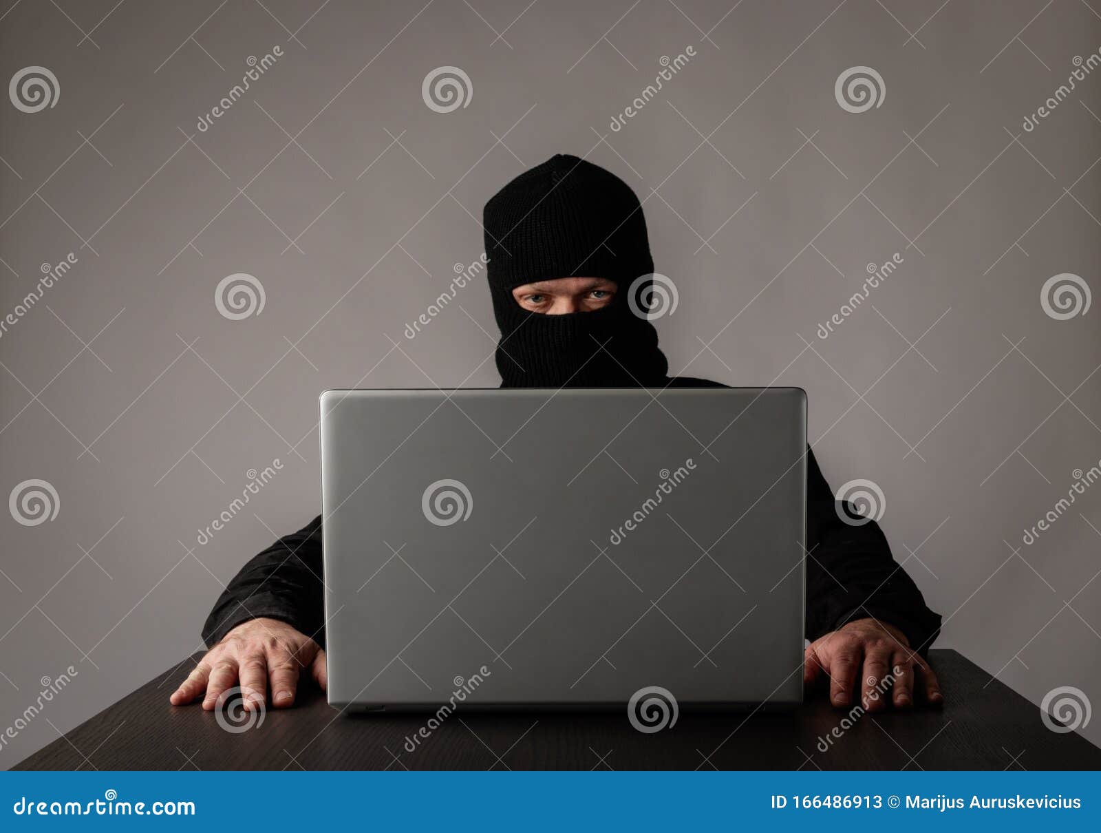 Hacker in Mask Using a Laptop Stock Image - Image of mask, access ...