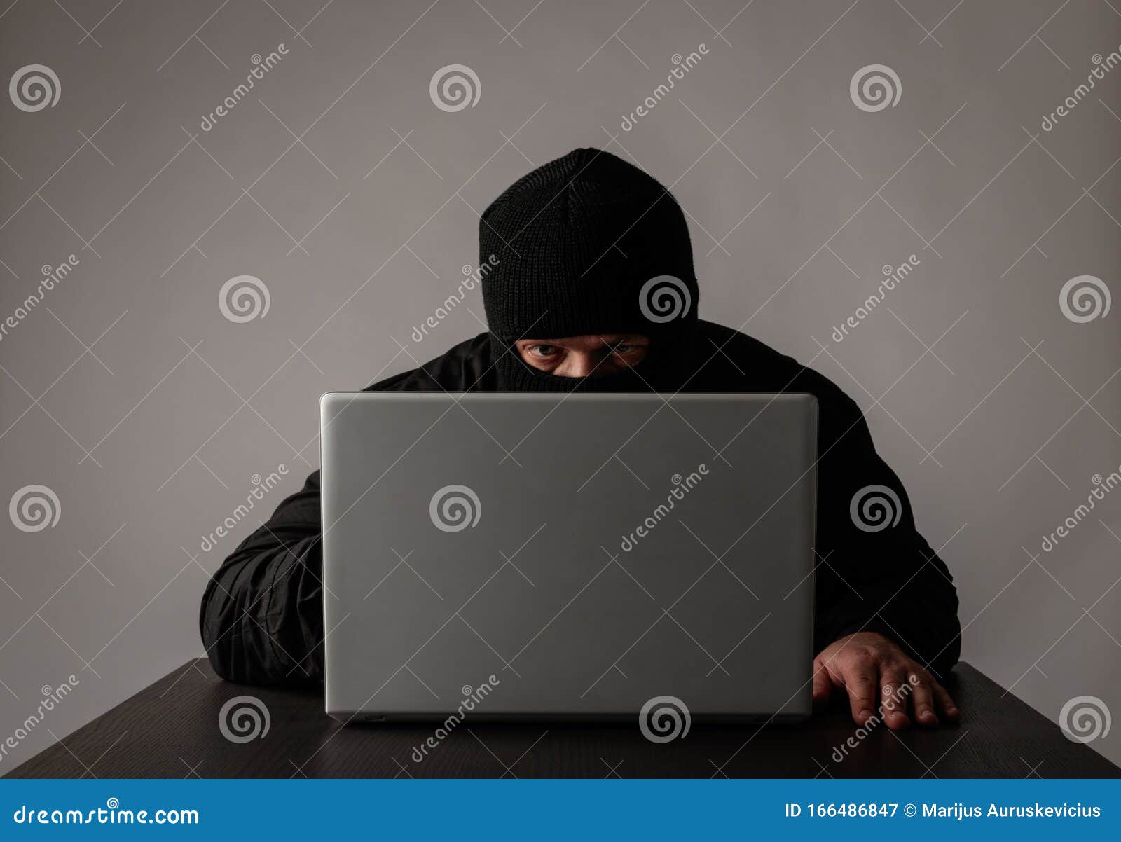 Hacker in Mask Using a Laptop Stock Image - Image of crime, encryption ...