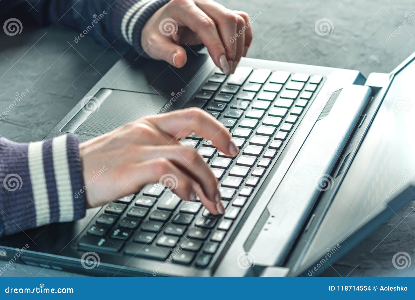 Hacker The Programmer Is Typing On The Keyboard Of The Laptop To Hack