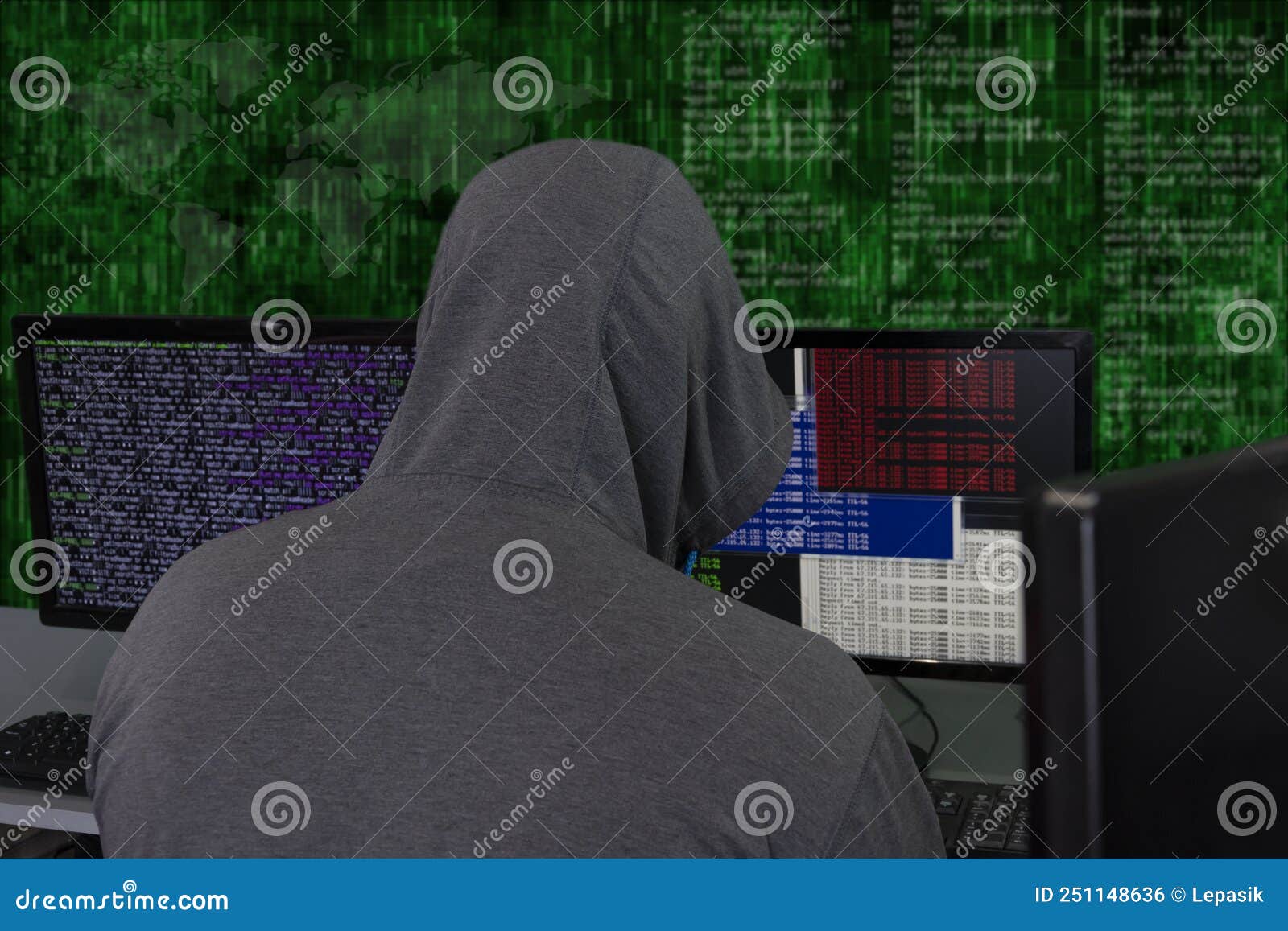 A Hacker Sits Behind Computer Monitors on an Abstract Background ...