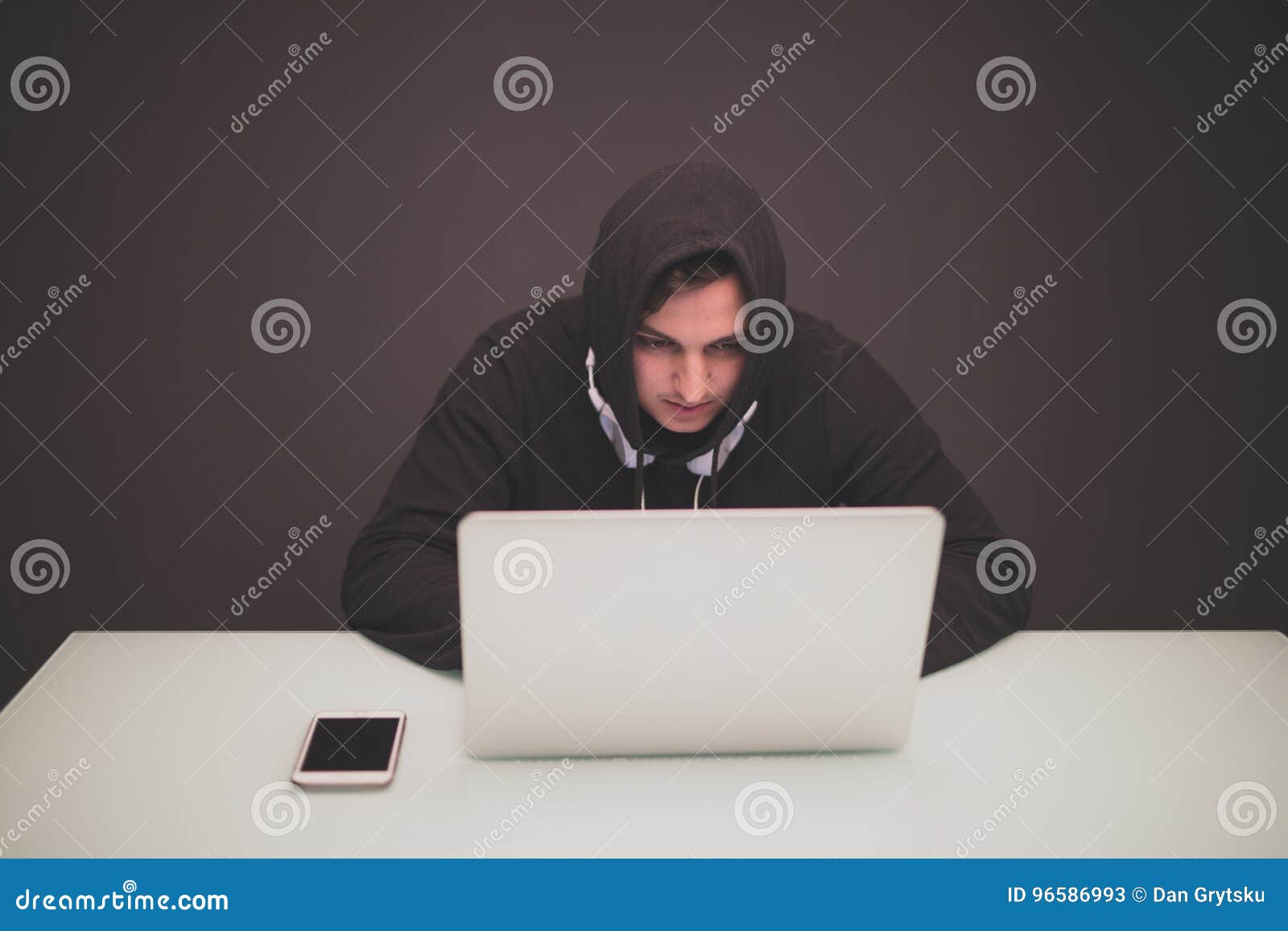 Hacker a Sitting at a Desk in the Darkness Stealing Information Stock ...