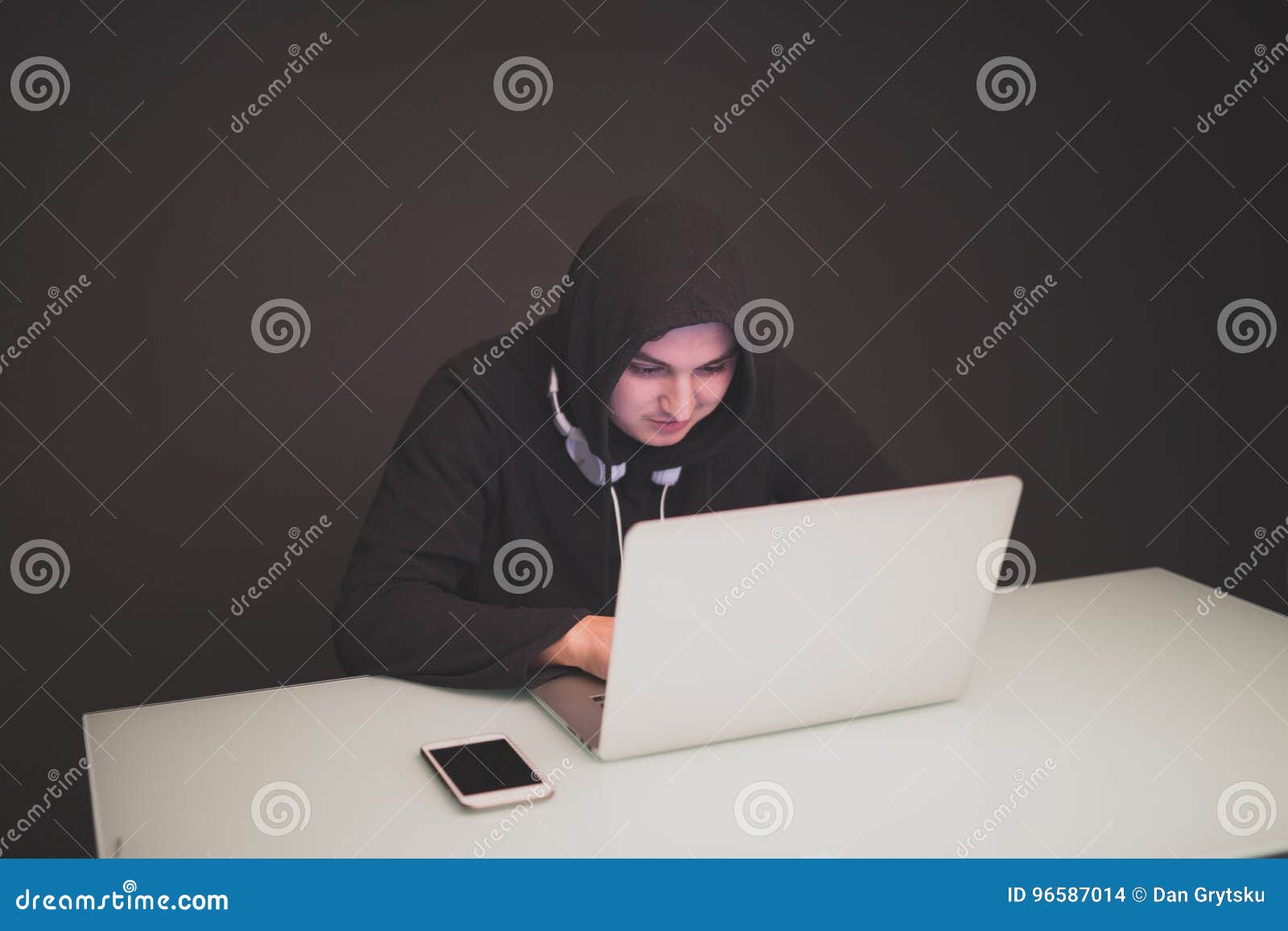 Hacker a Sitting at a Desk in the Darkness Stealing Information Stock ...