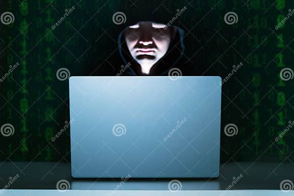 Hacker Sitting in Front of the Laptop at Night, Low Light with Zero and ...