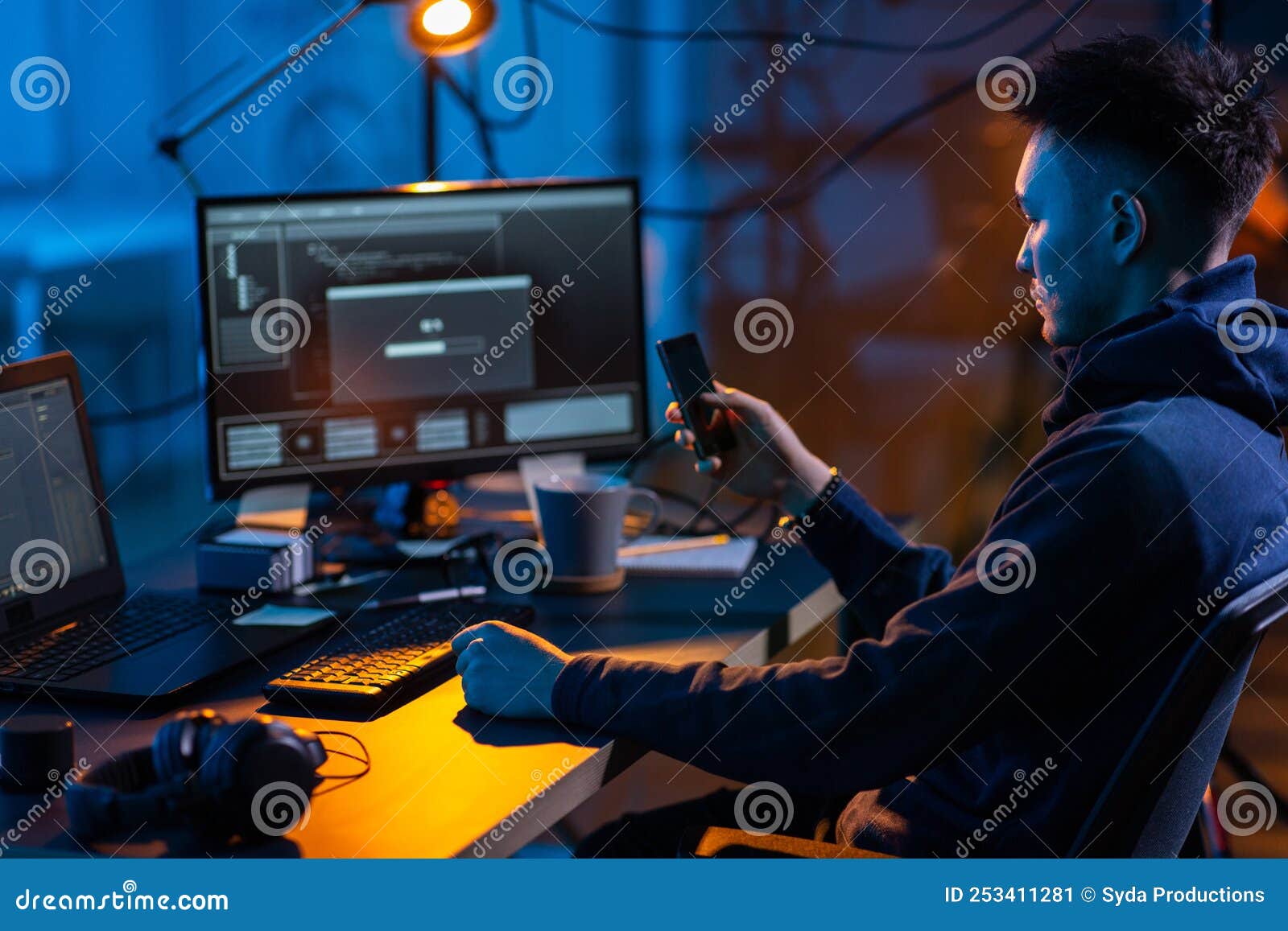 Hacker with Smartphone and Computers in Dark Room Stock Image - Image ...