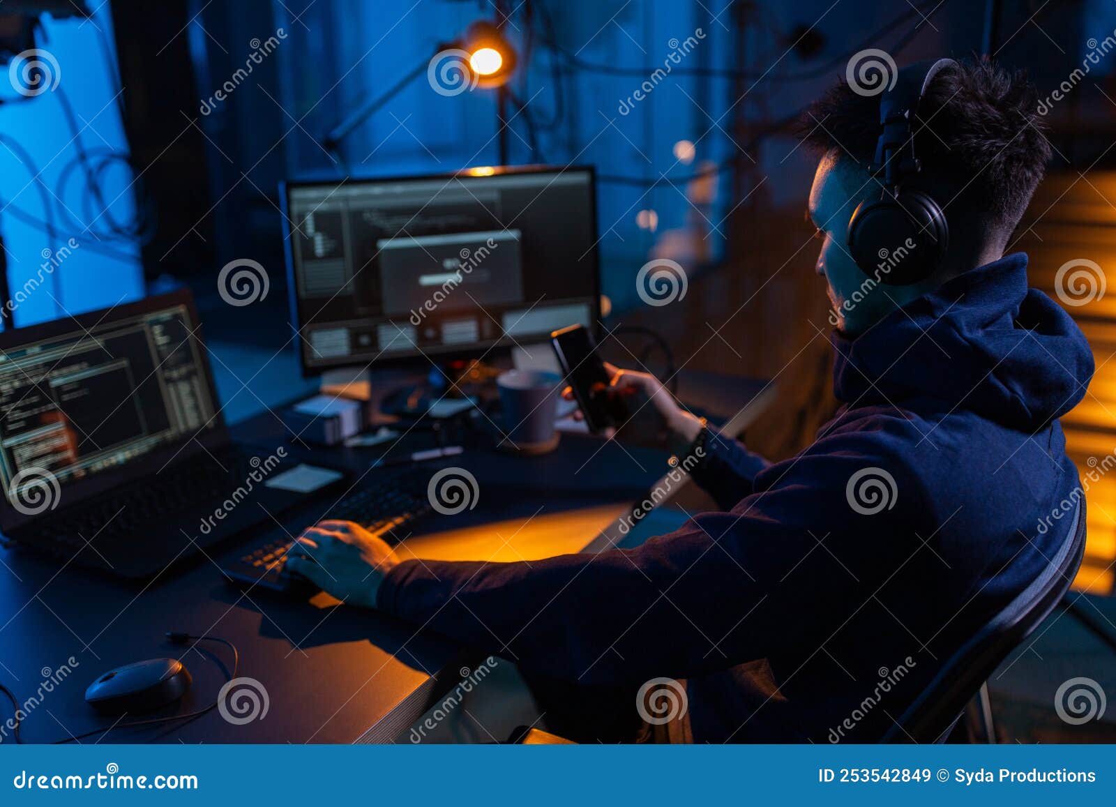 Hacker with Smartphone and Computers in Dark Room Stock Image - Image ...
