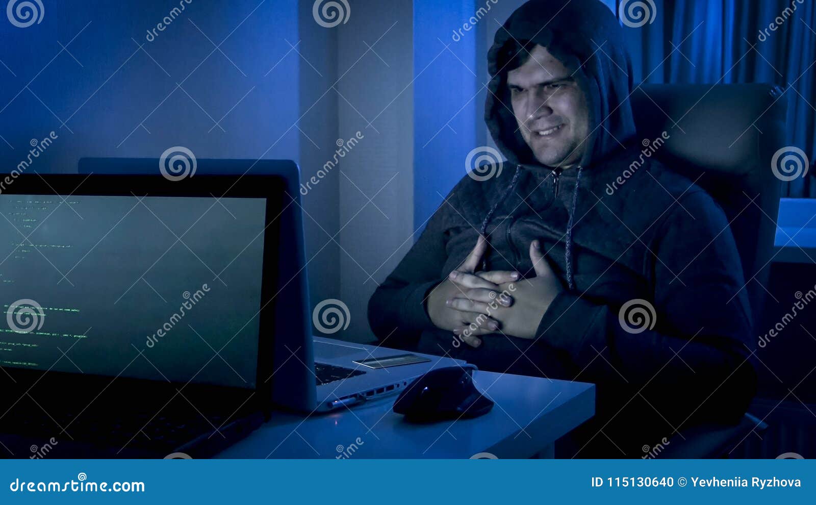 Portrait of Hacker Smiling and Relaxing in Chair after Writing Program ...