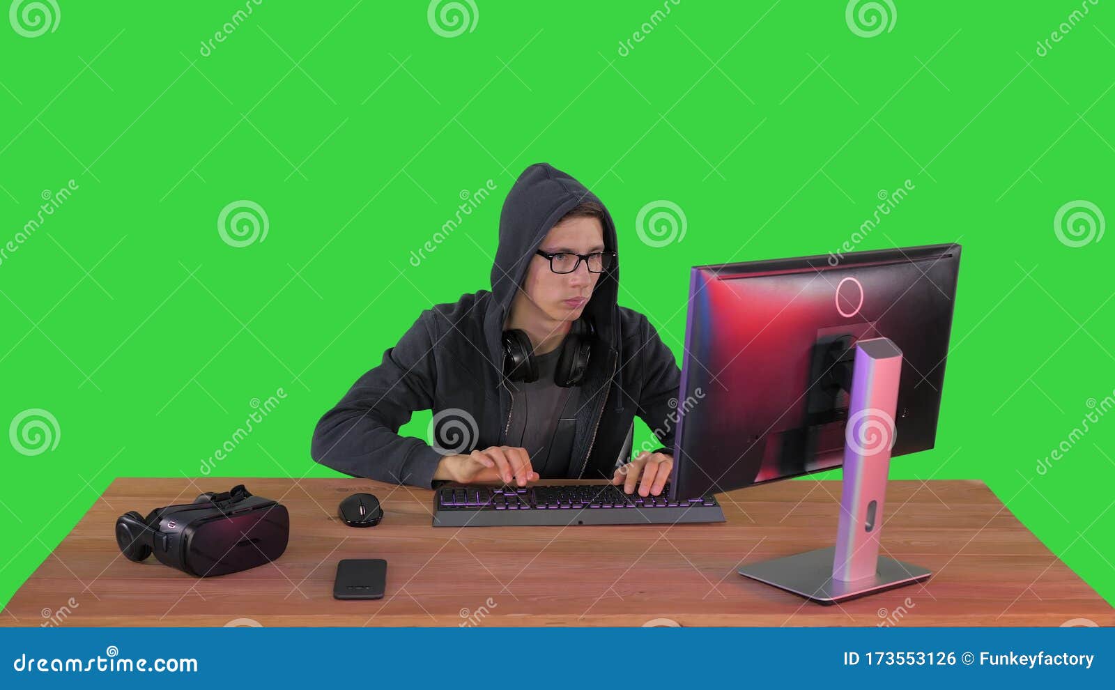 Hacker Typing at Computer Quickly on a Green Screen, Chroma Key. Stock ...