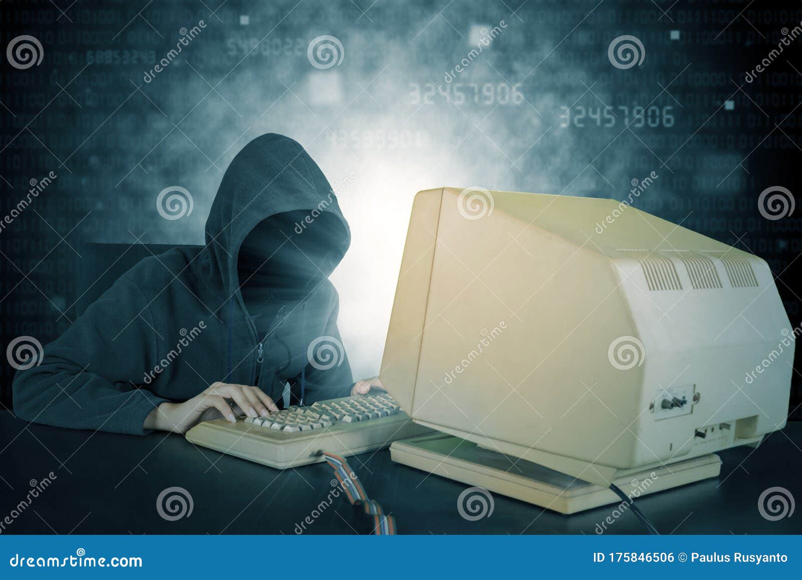 Hacker Typing On A Laptop Isolated On Black Background With A Computer