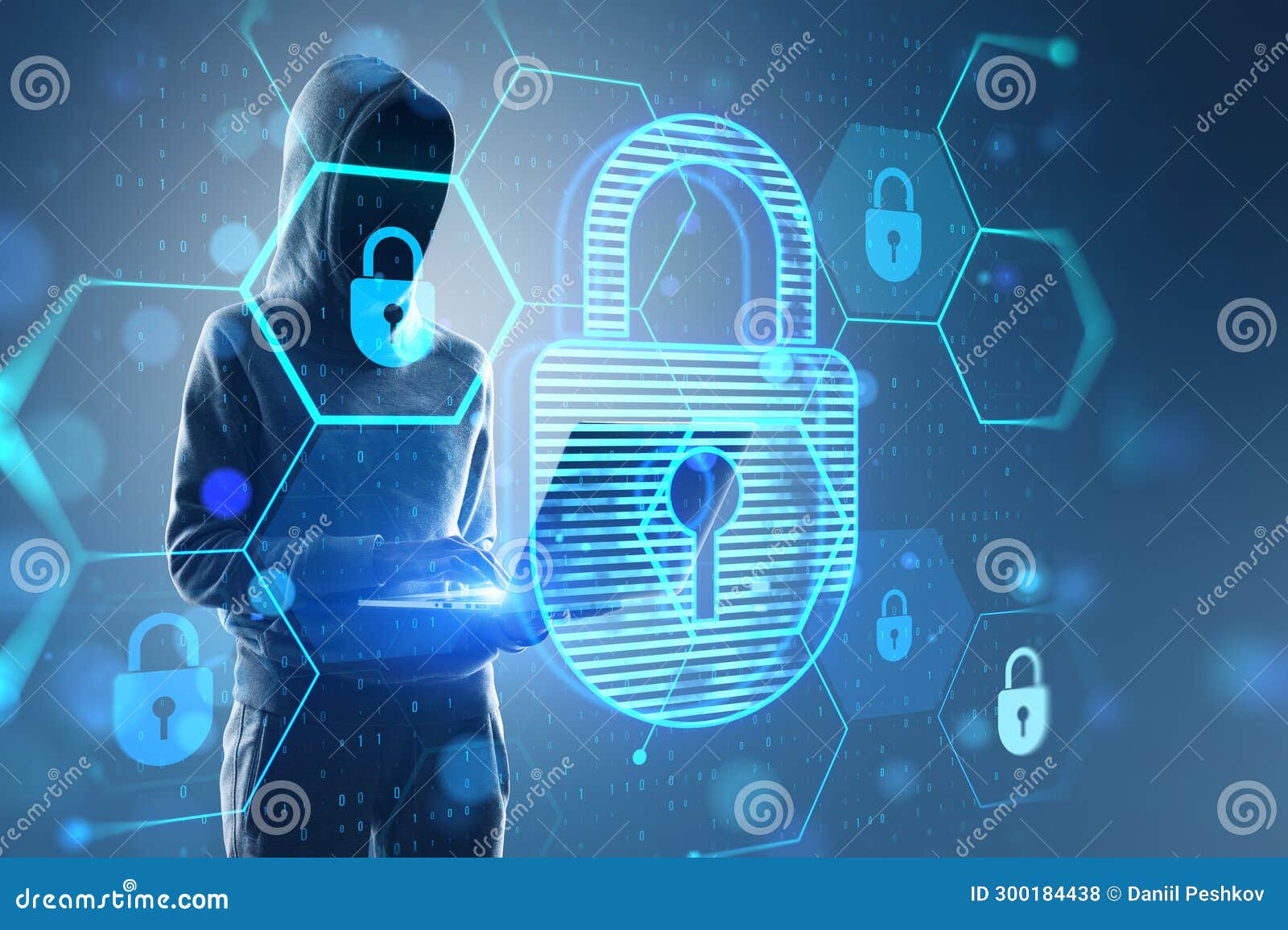 Hacker Using Laptop with Glowing Hexagonal Padlock Hologram with Binary Coding on Blurry ...