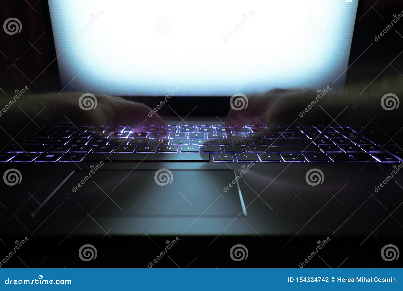 Hacker Using Laptop. Lots of Digits on the Computer Screen Stock Photo ...