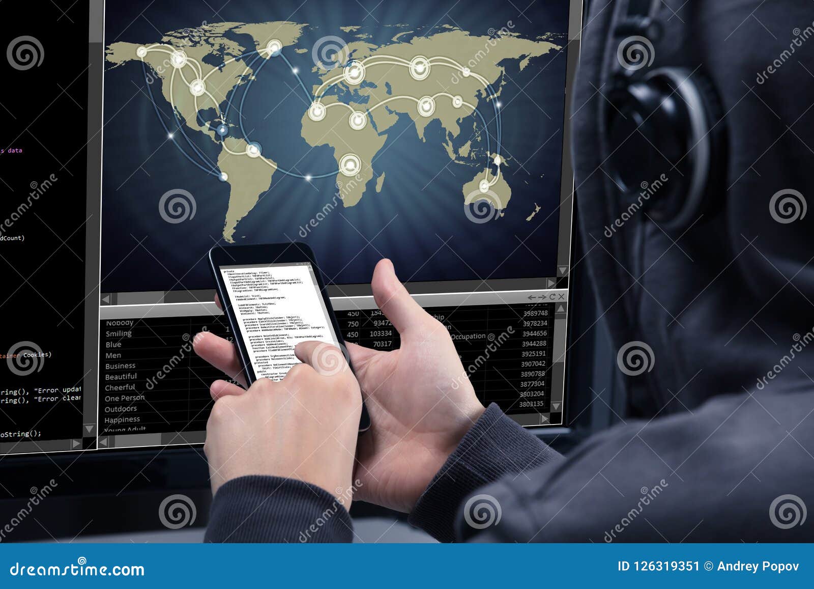 Hacker Using Mobile Phone For Stealing Data From Computer Stock Image 6664