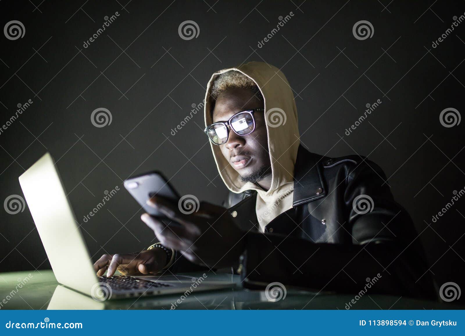 Afro American Hacker Using Mobile Smartphone Calling For Victim And