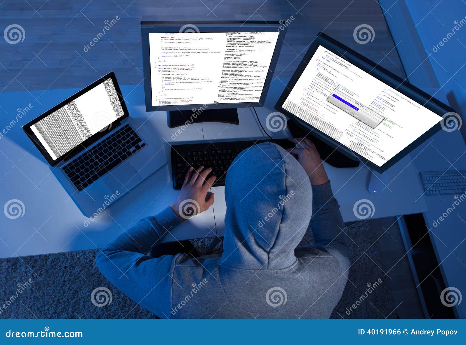 Hacker Using Multiple Computers To Steal Data Stock Photo - Image of internet, download: 40191966